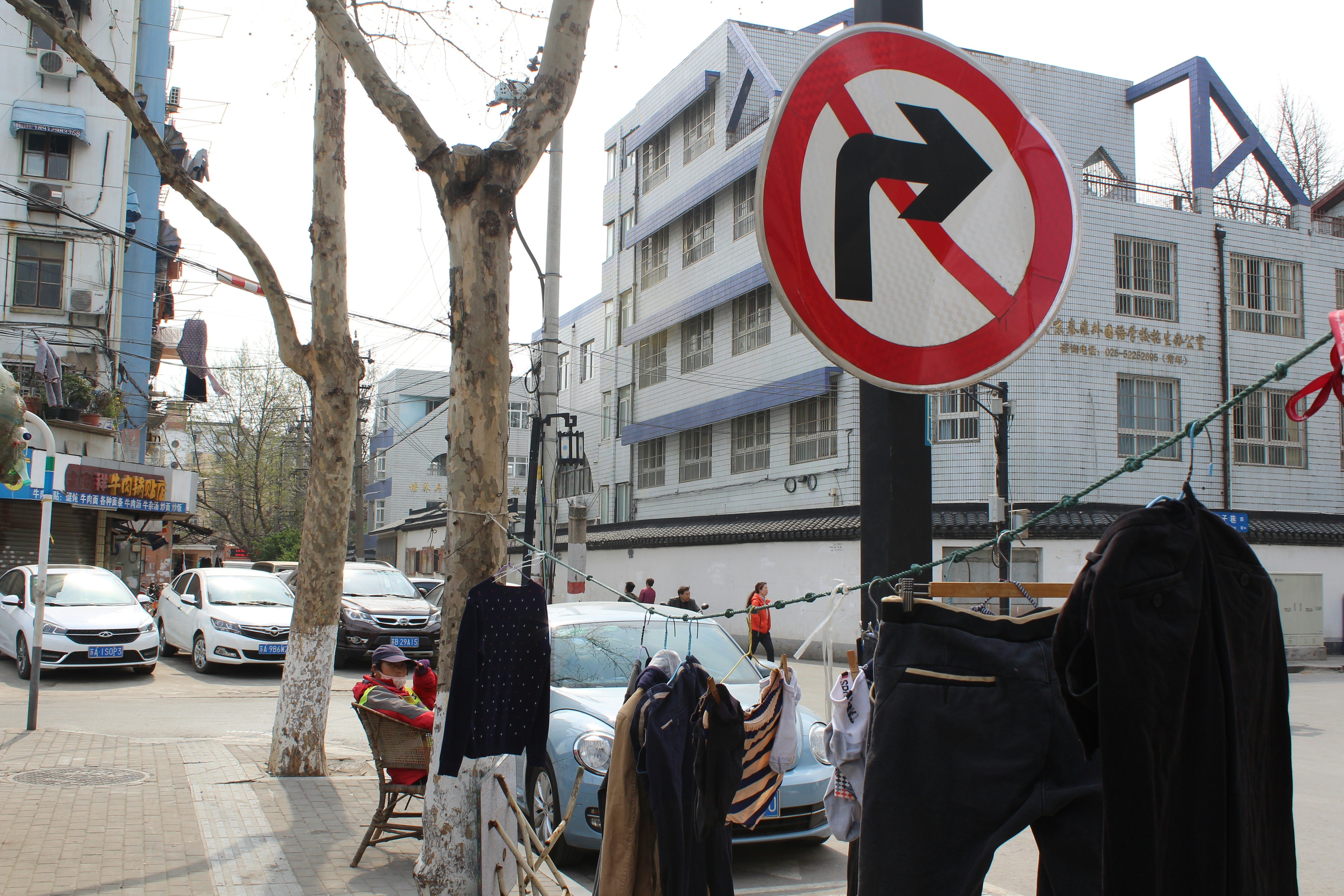 Market Street Portrait under a No-Left-Turn Sign