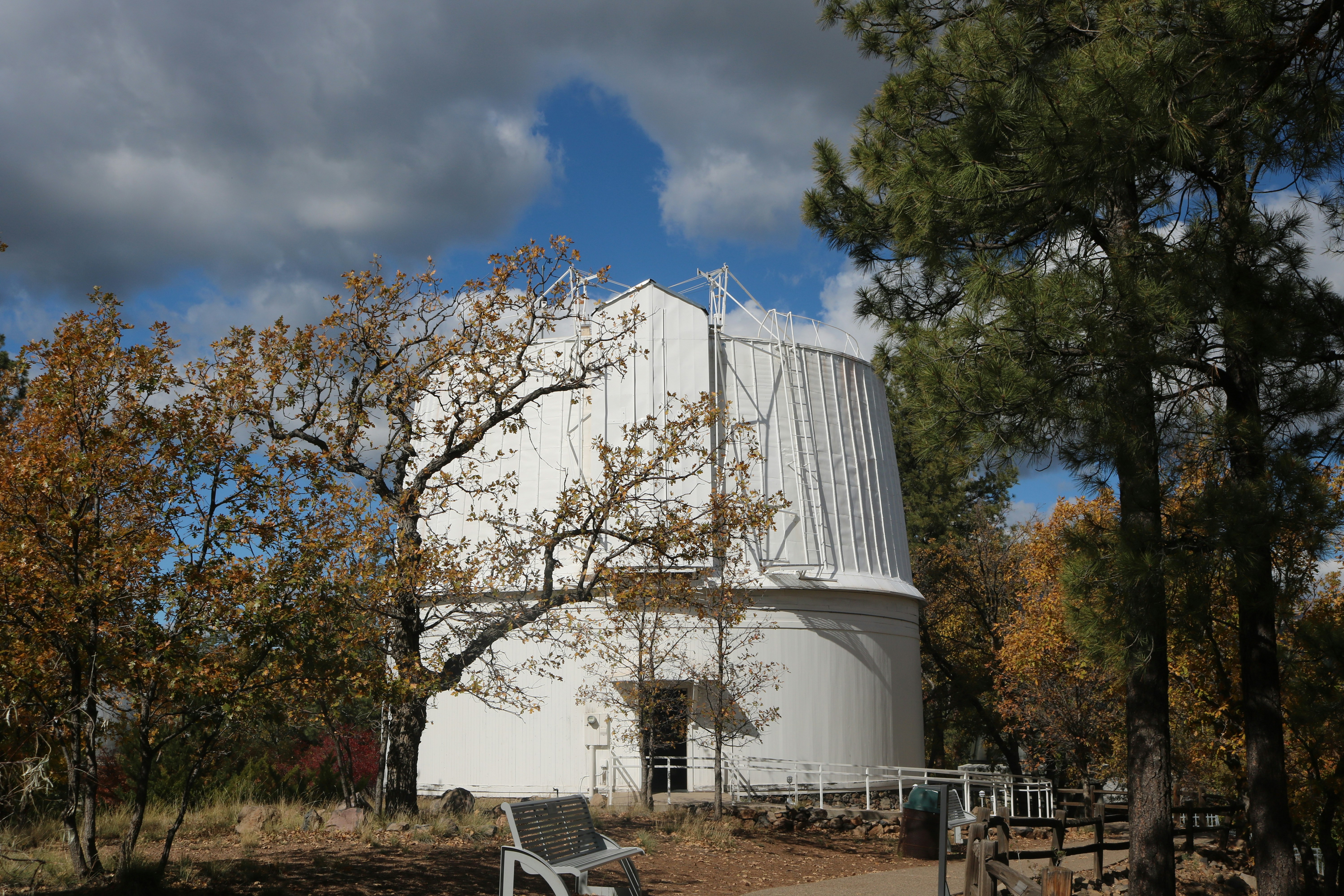 White Observatory Dome Surrounded by Autumn Trees