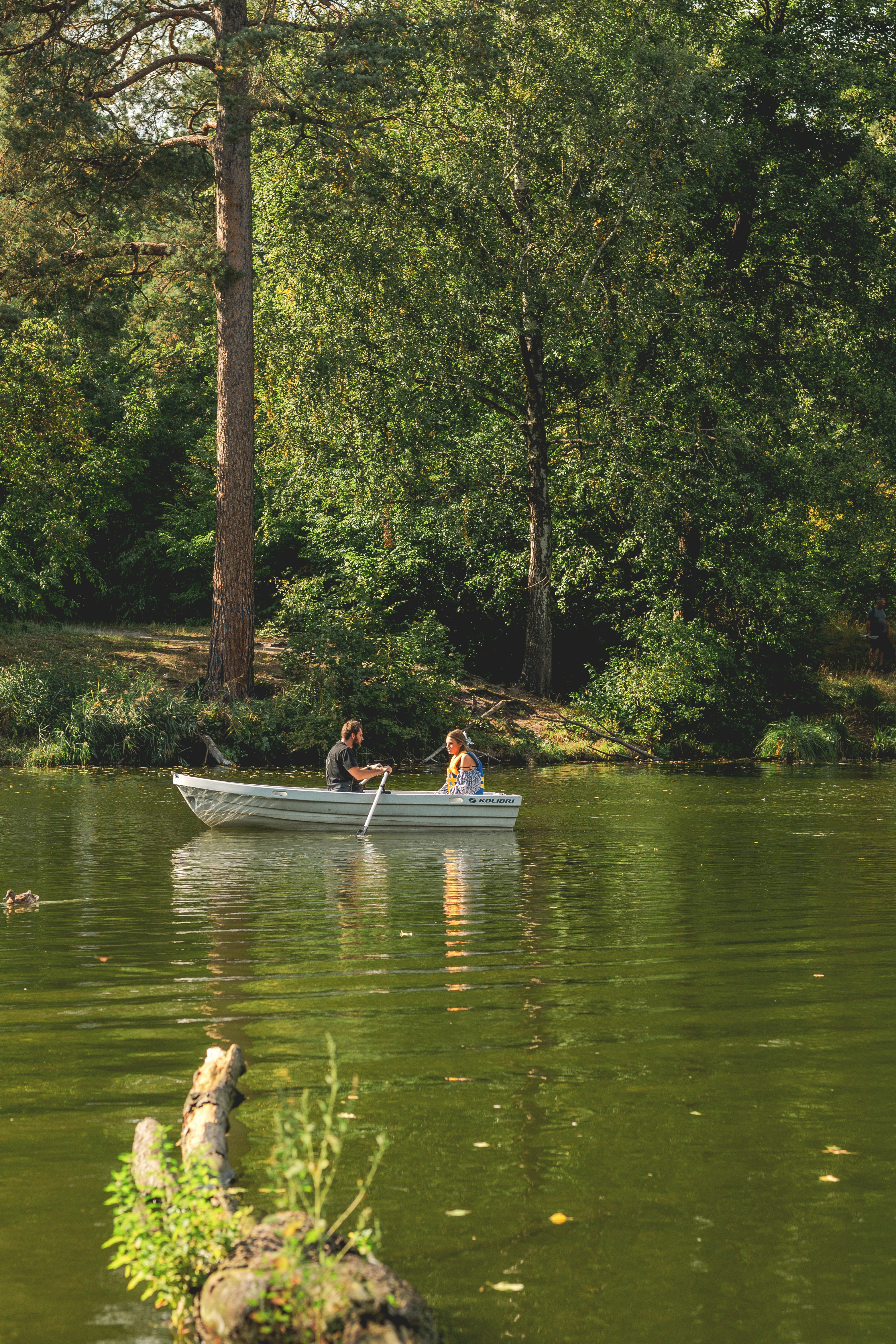 Boat Conversation on a Quiet River