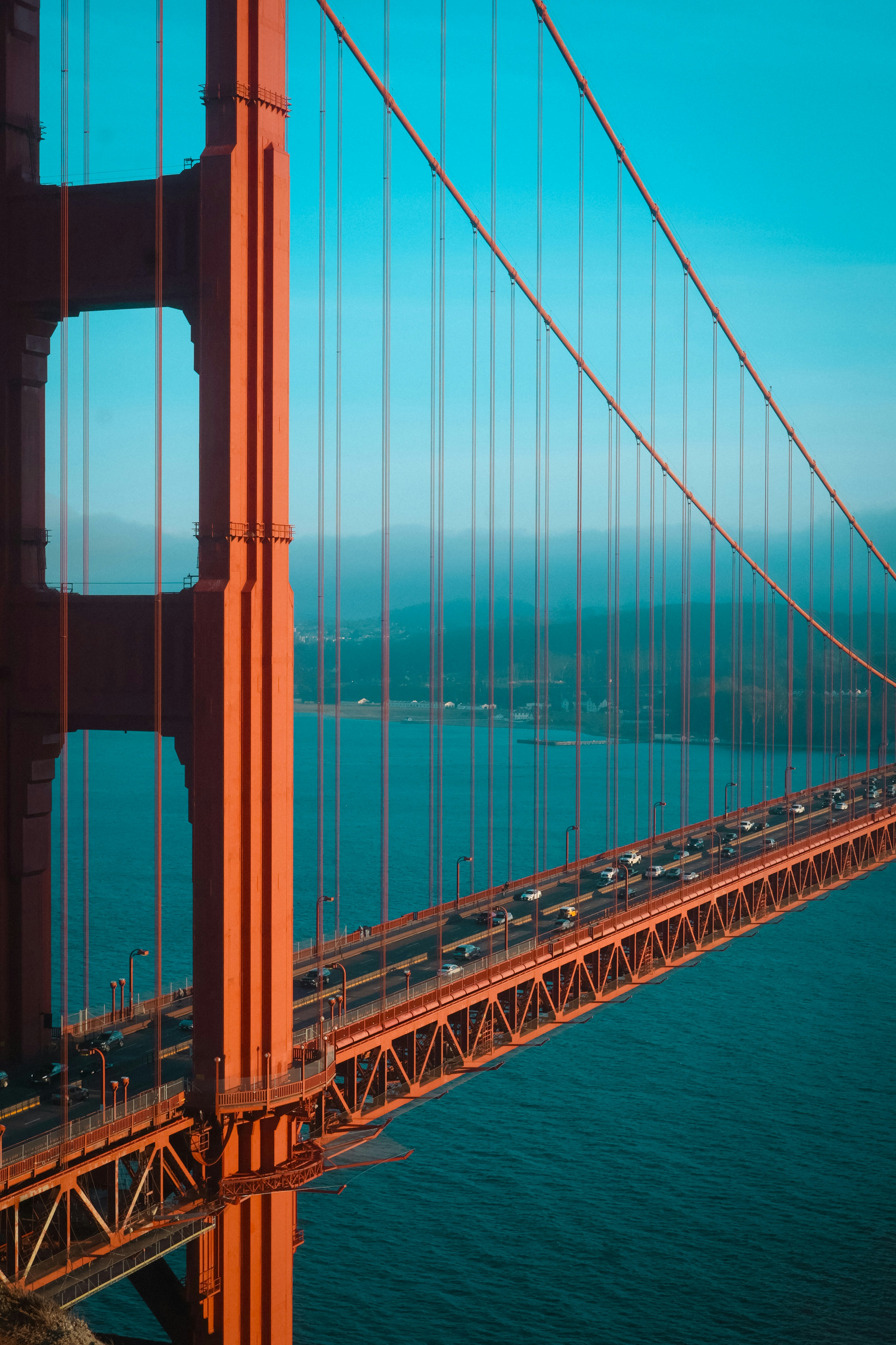 Red Rivet Horizon: The Golden Gate's Vertical Veil Over the Bay