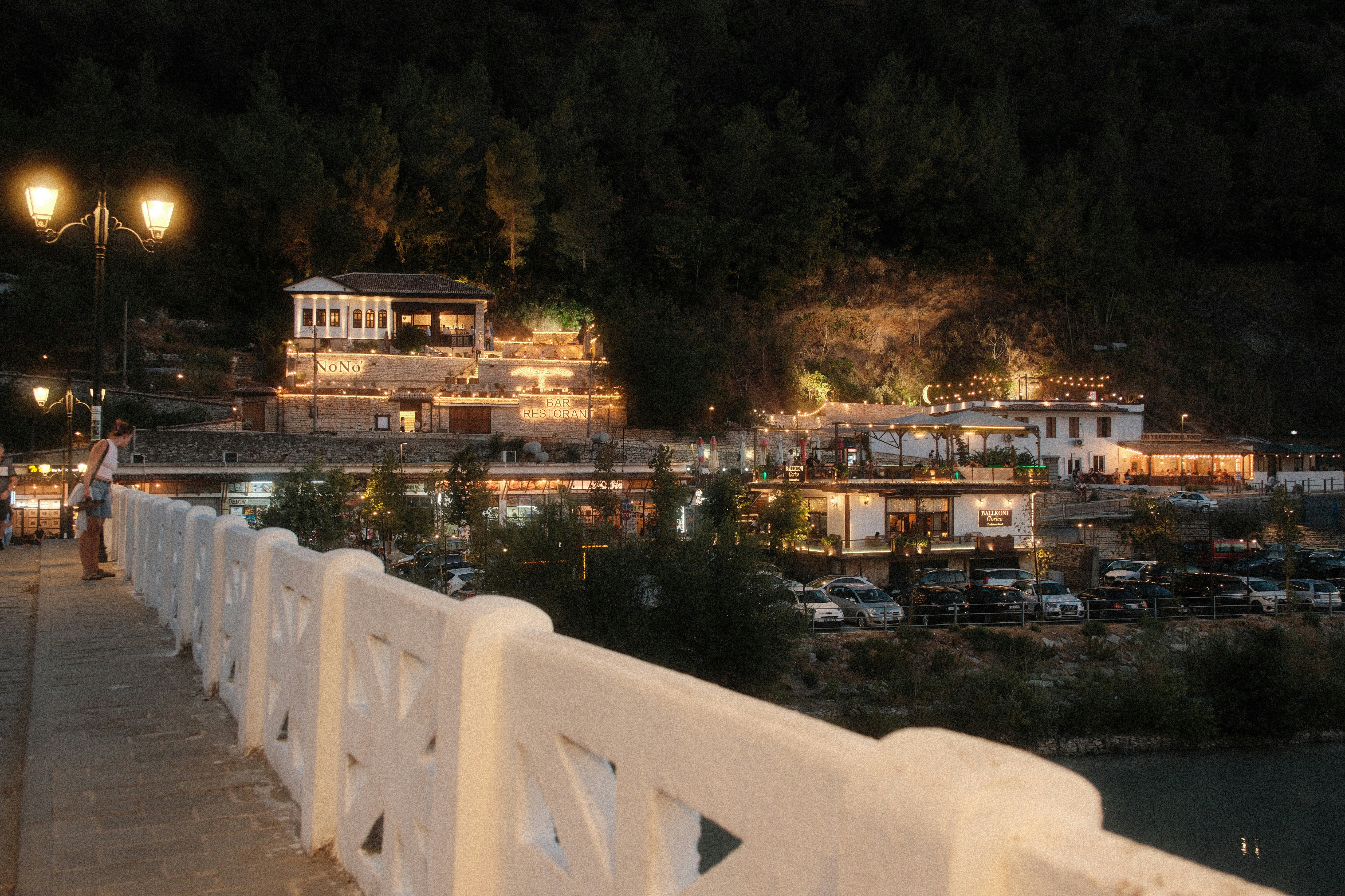 Nightlight Marina: A Quiet Riverside Boardwalk Under Warm Glow