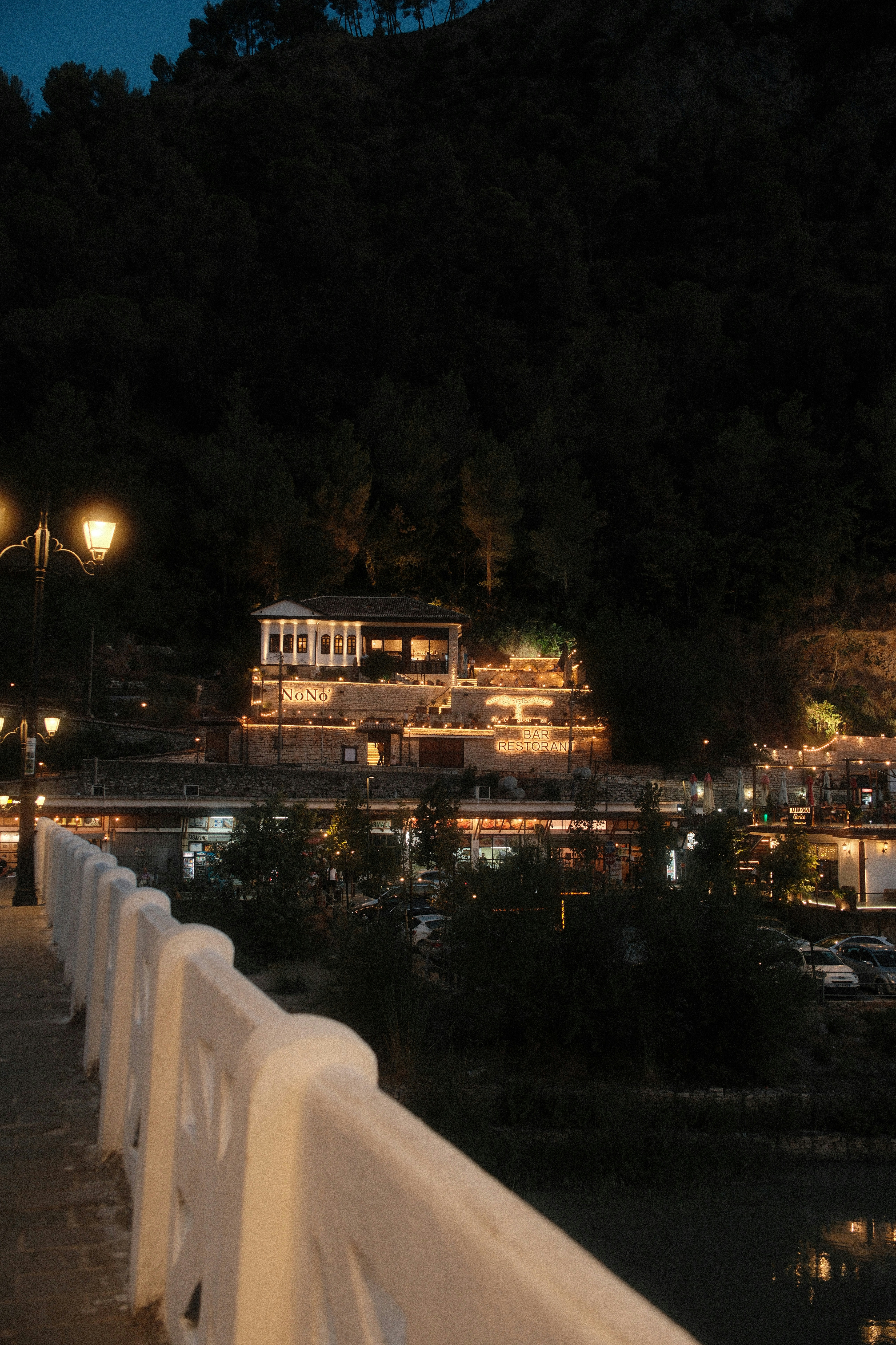 Luminous Terrace by the Night Harbor