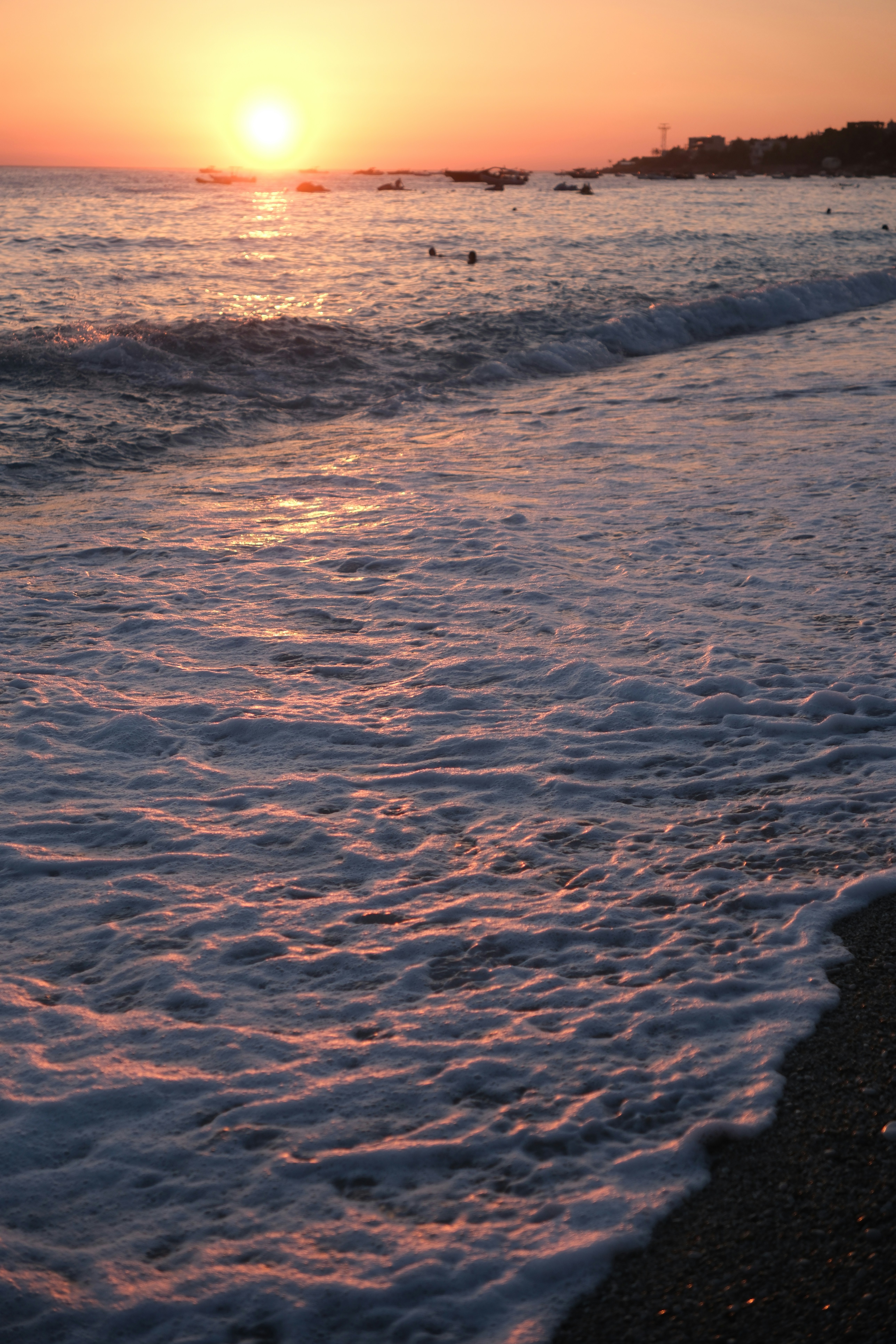Horizon Fire: Sunset Over a Shimmering Sea