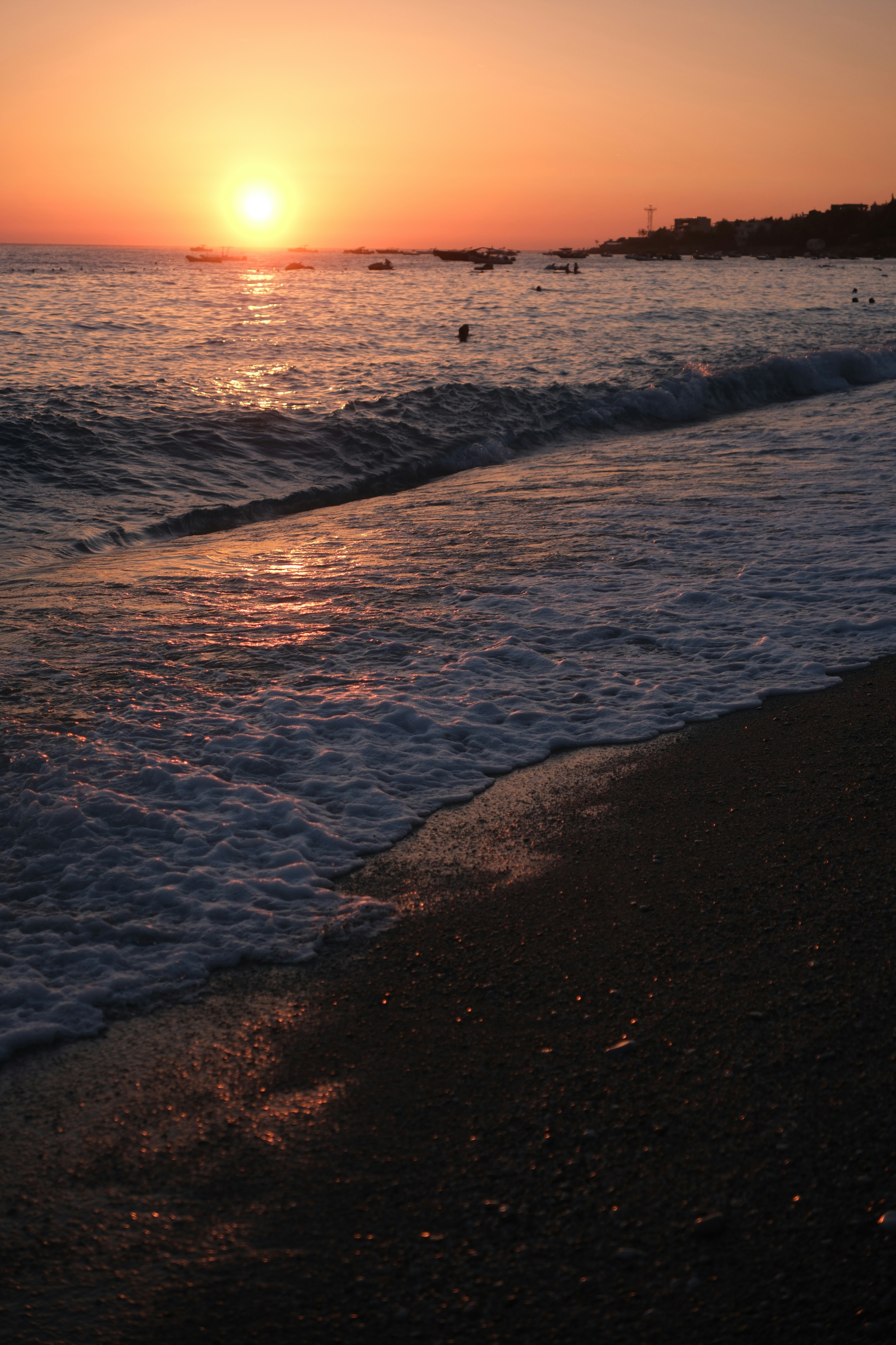 Gold Hour on the Shoreline: A Quiet Sea at Sunset