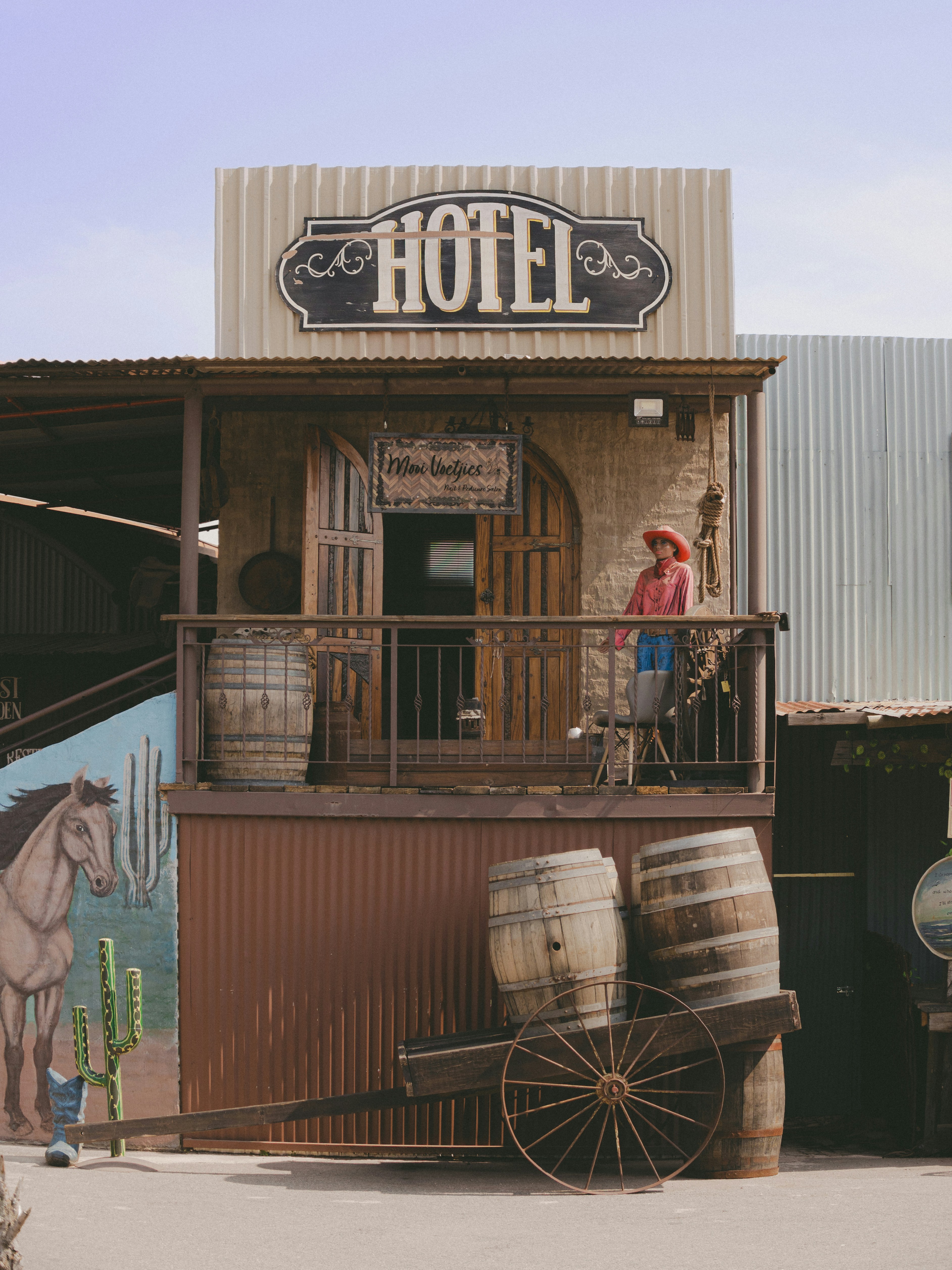 Dusty Frontier Inn: A Western Porch Portrait