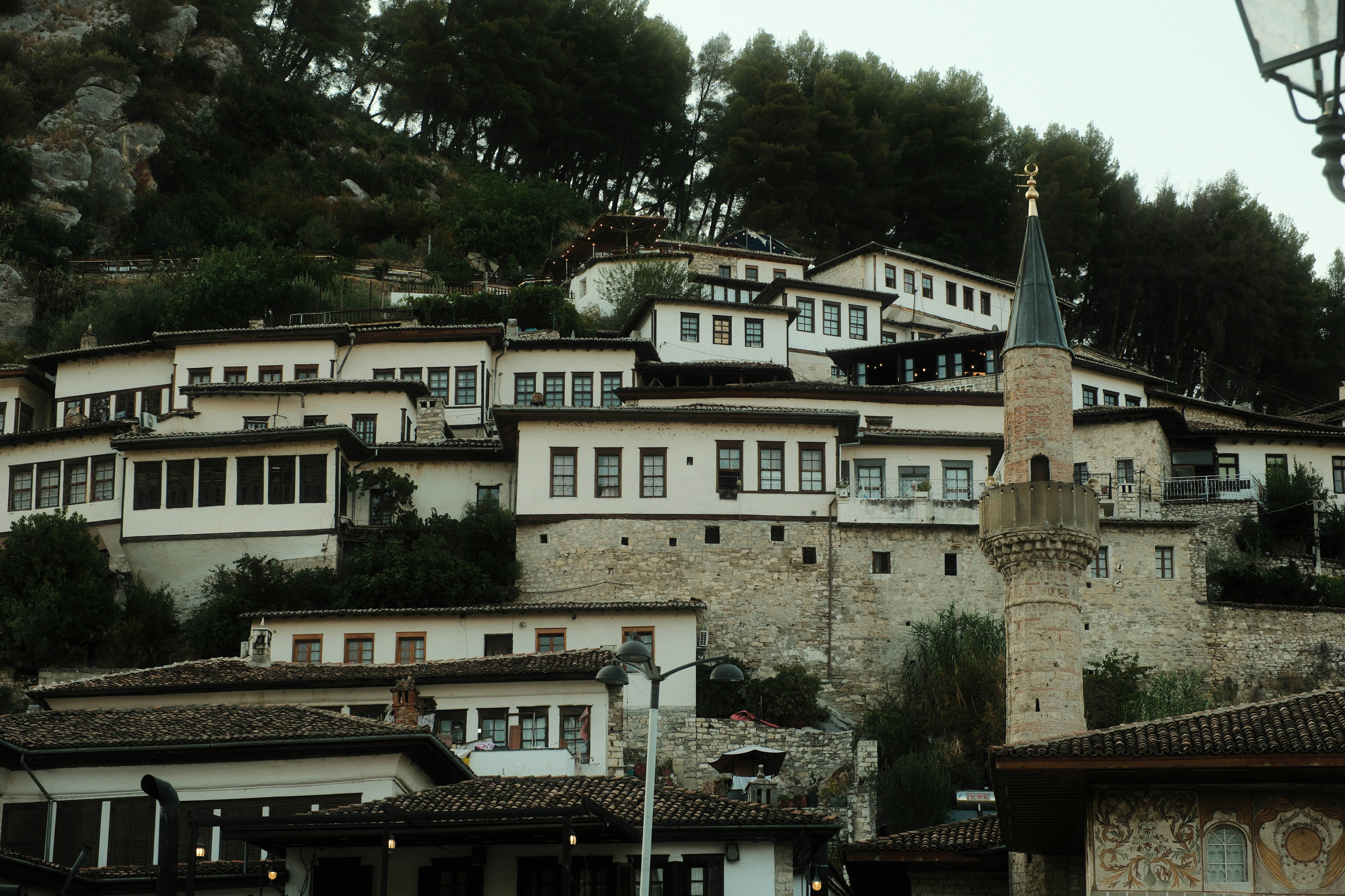 Stone Village Tiers: A Terraced Complex Crowned by a Spire