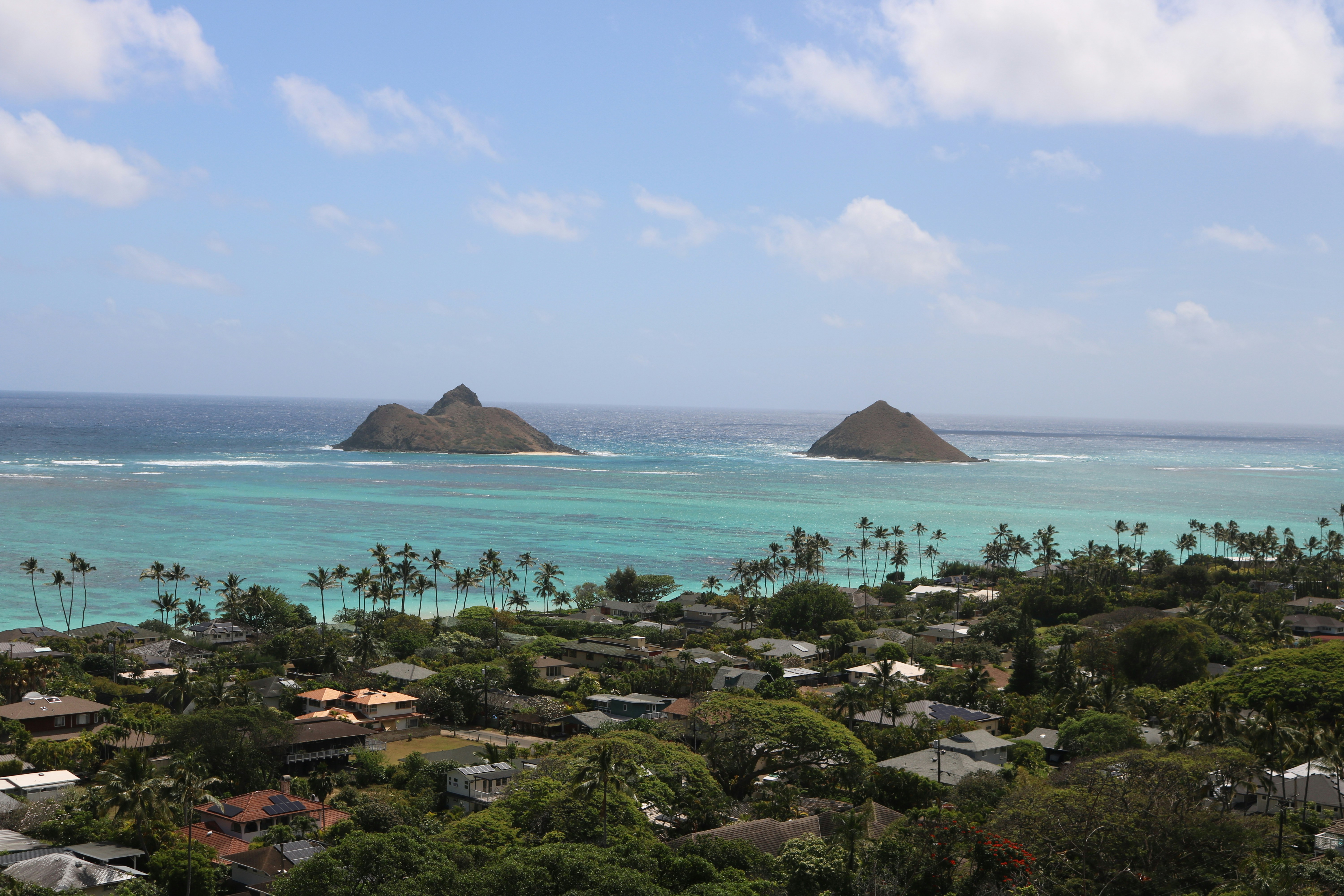 Islands on the Horizon: A Coastal Village Beneath Turquoise Seas
