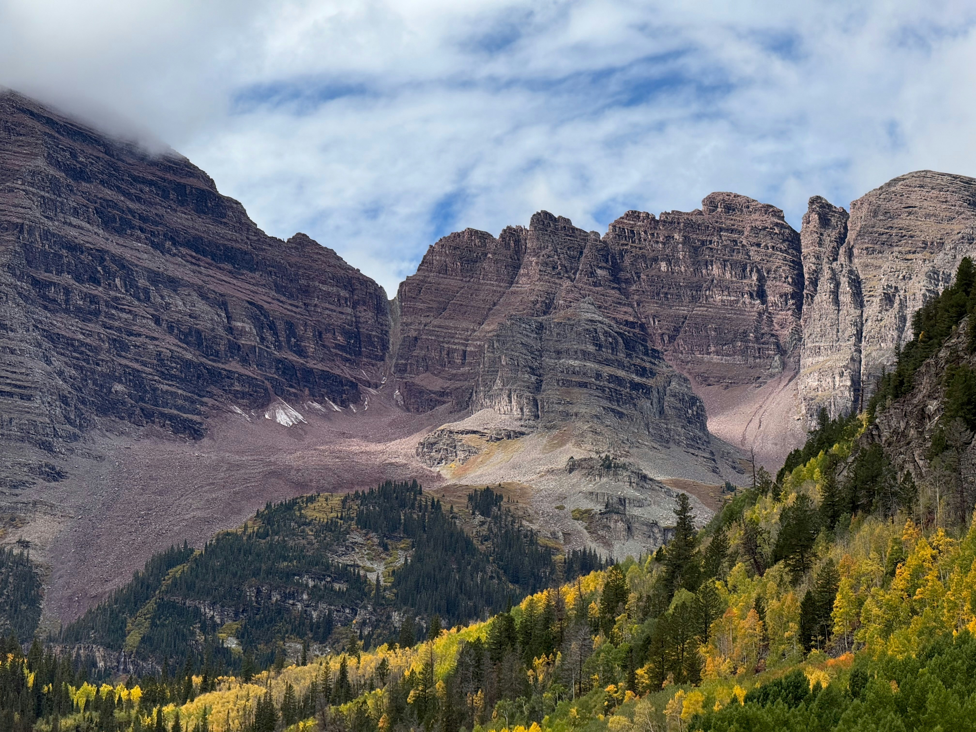 Stone Choir Overlook: Sunlit Peaks Rising Above Forest Serene
