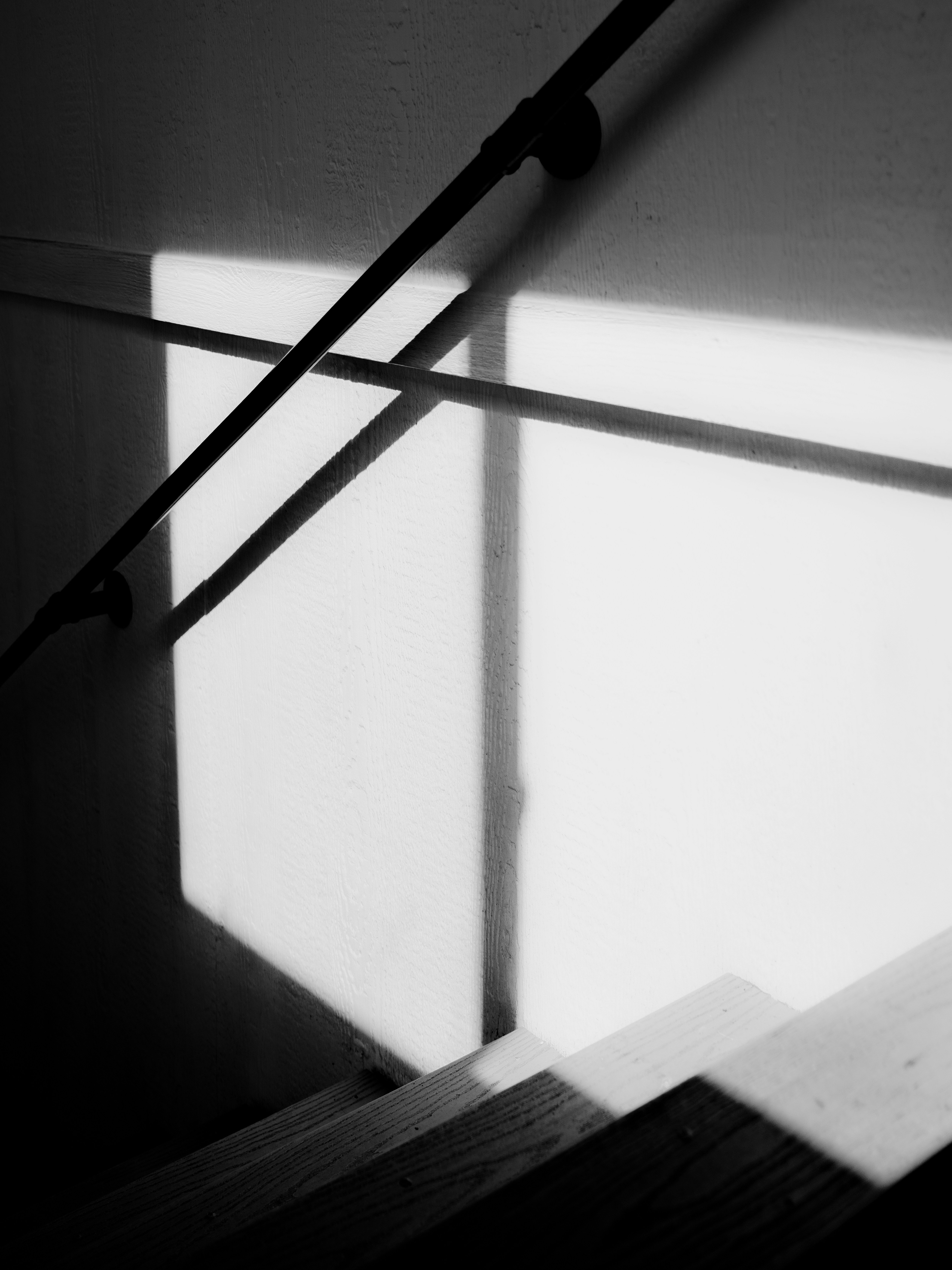 Shadows on the Stair: An Aerial of Light and Rail