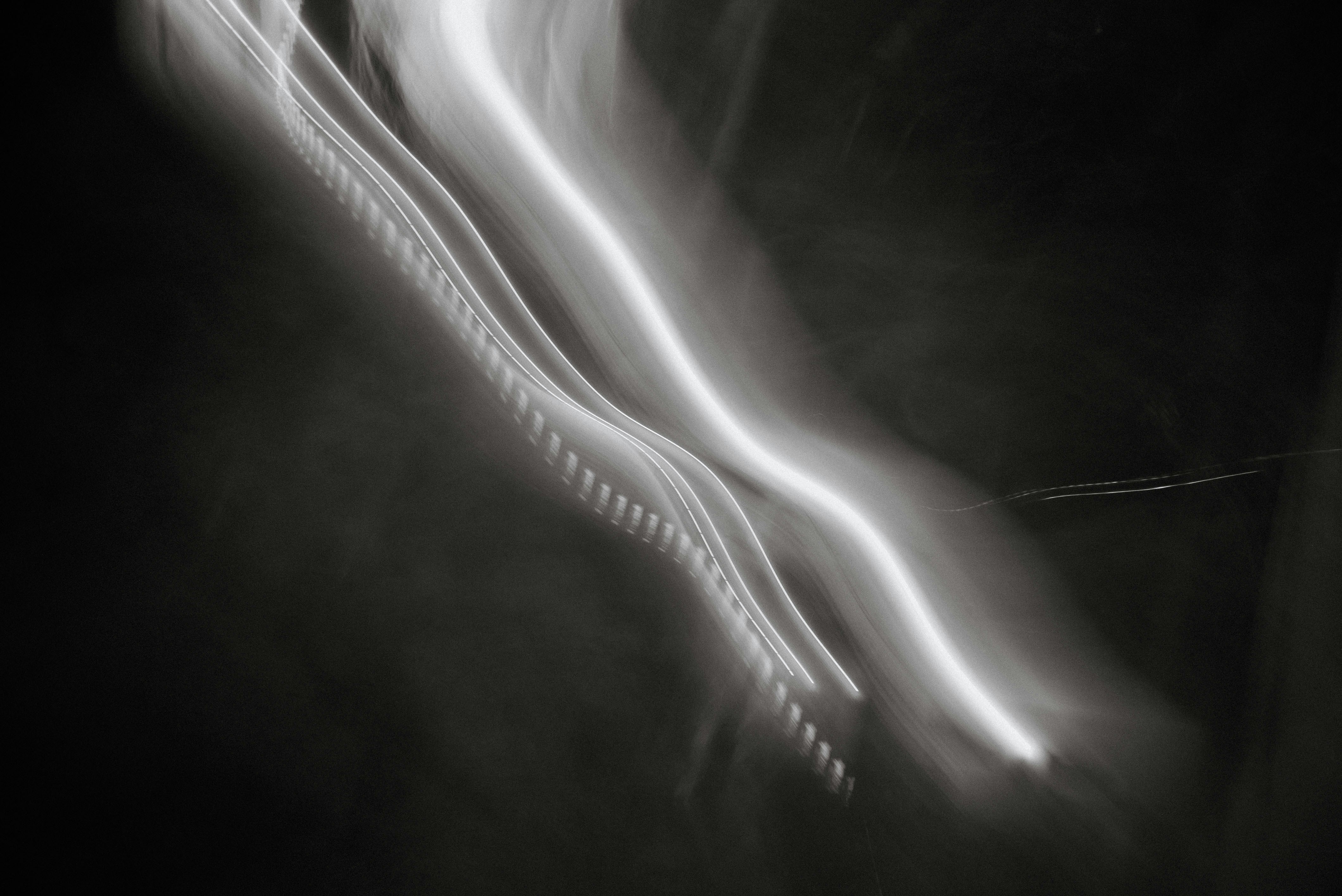Midnight Trace: A Ghostly Arc of Light