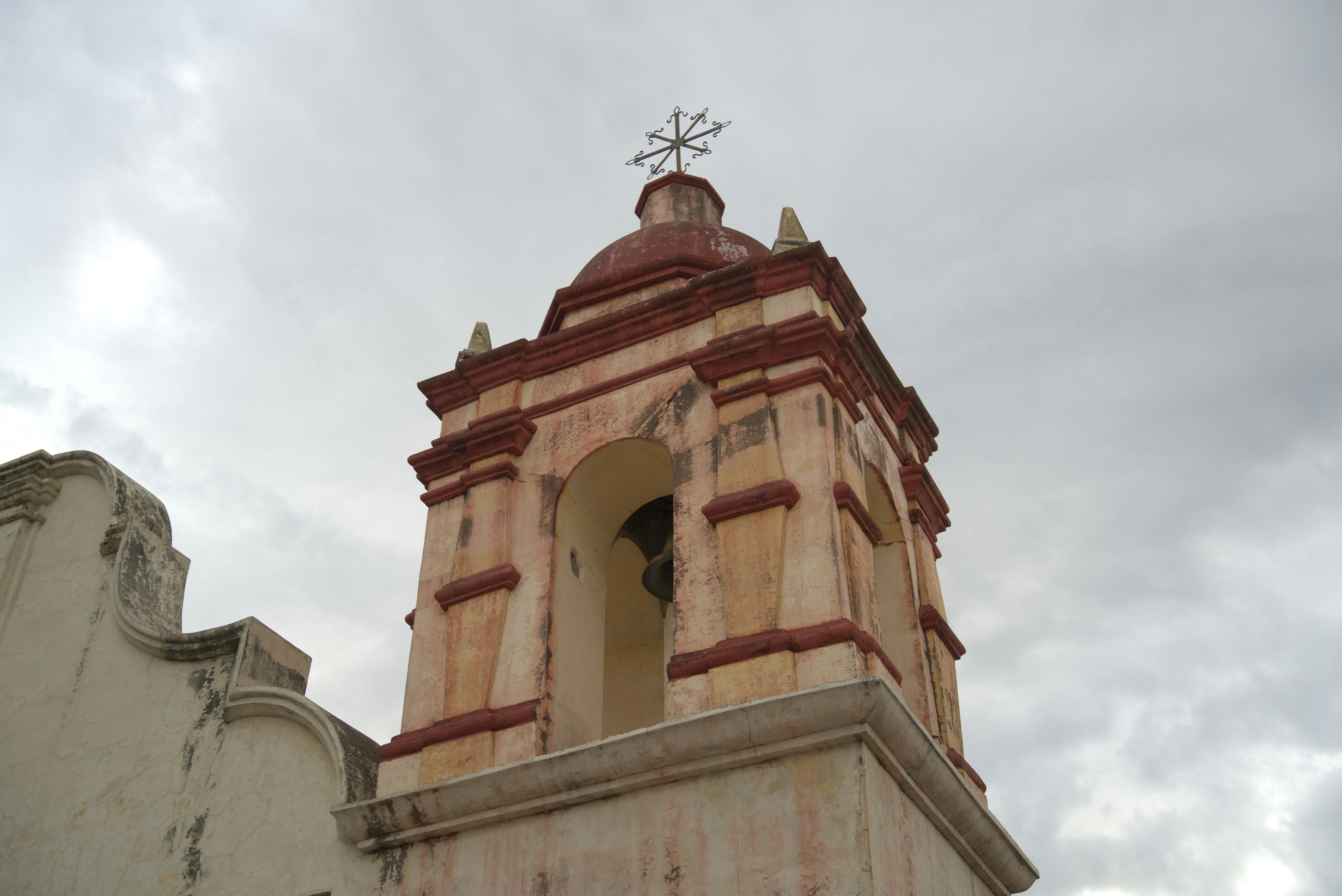 Cruciform Bell Tower Against a Overcast Sky