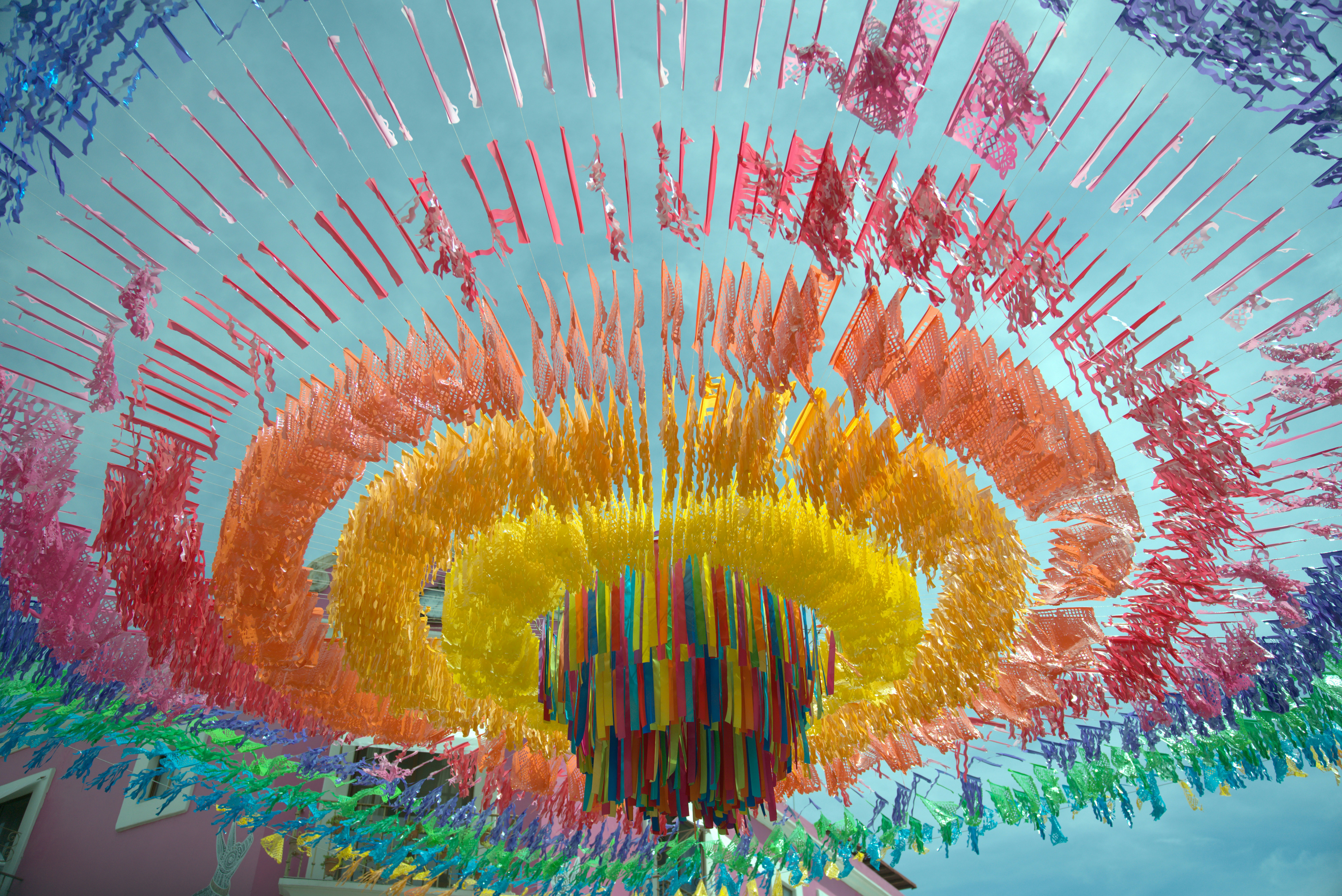 Vivid Ceiling Spirals: A Kinetic Ring of Colored Foliations
