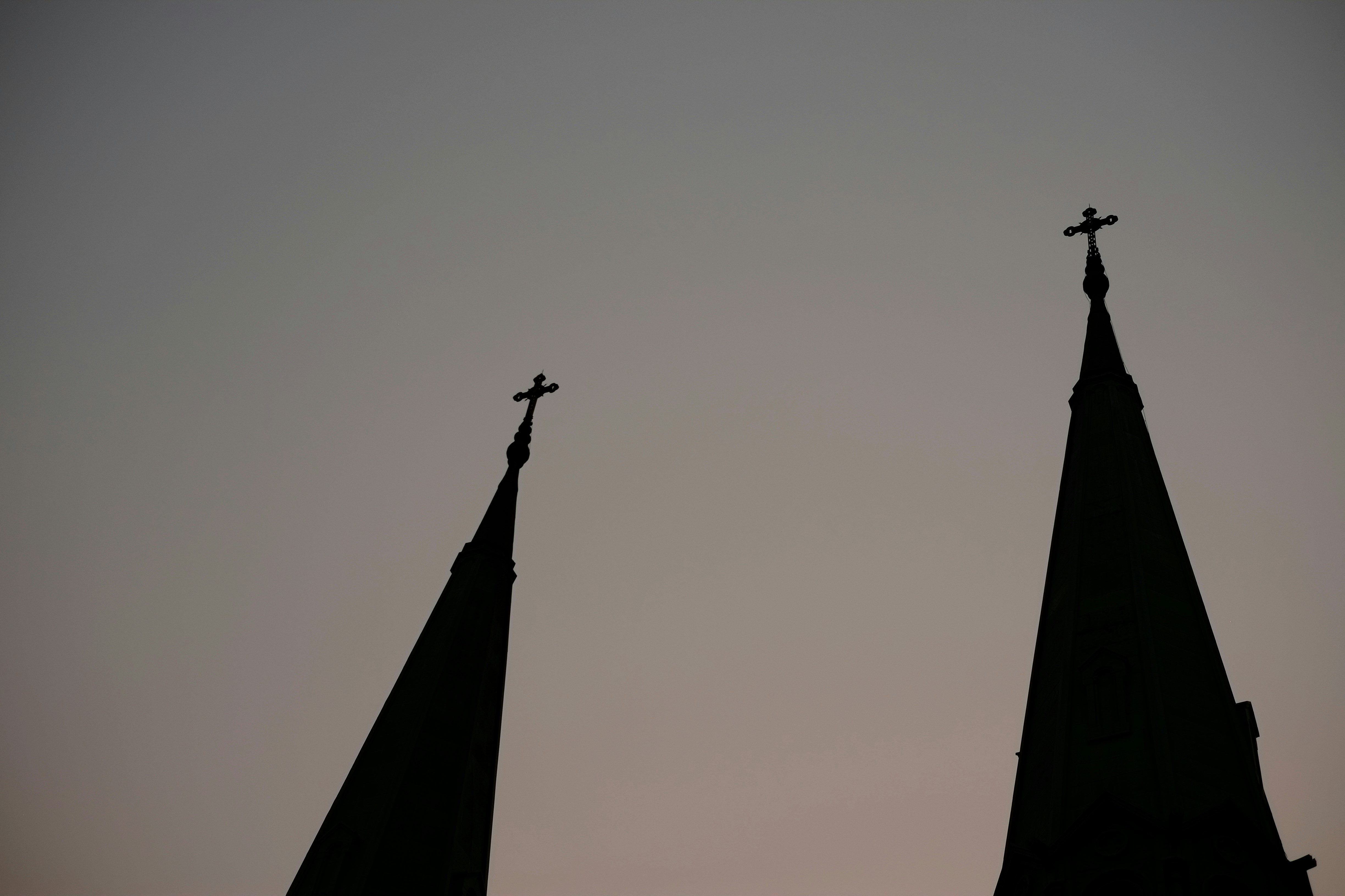 Silhouetted Cathedral Spires Against a Quiet Dusk Sky