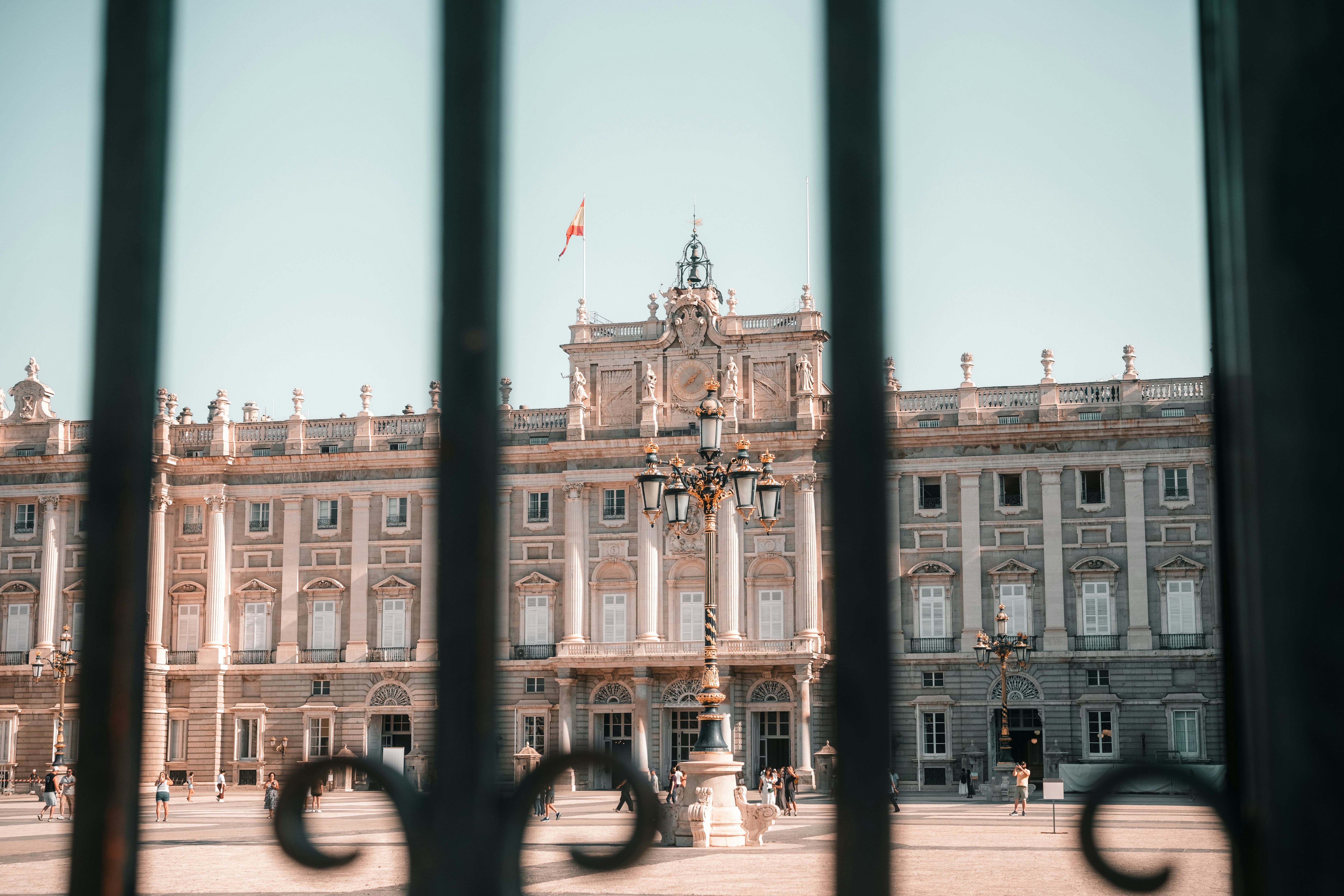 Barricaded Vista: The Historic Palace Through Ironwork