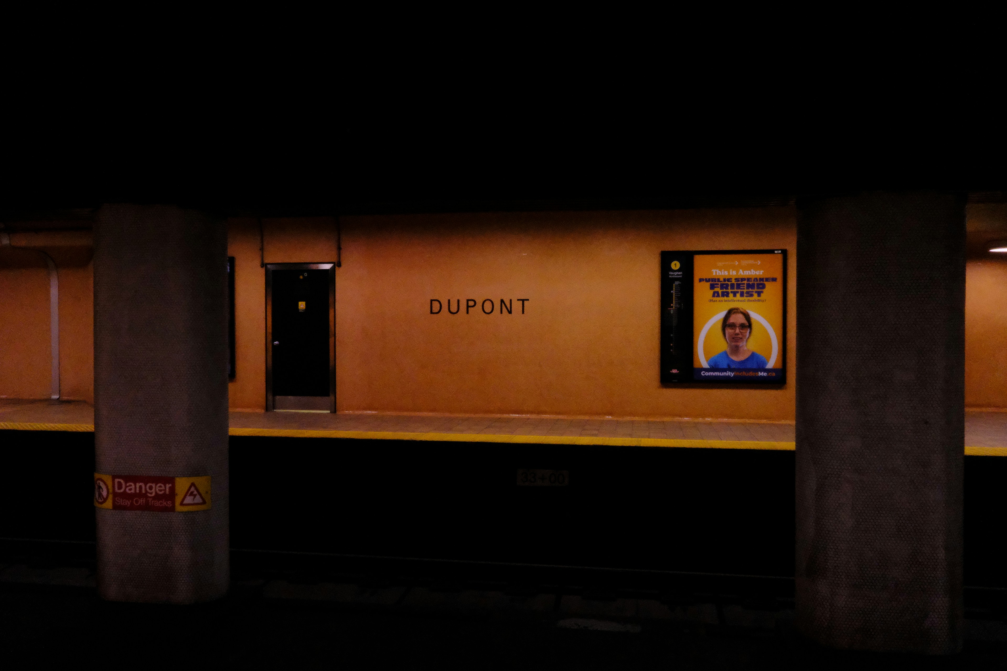 Quiet Platform at Dupont: A Warm-Bloomed Subway Moment
