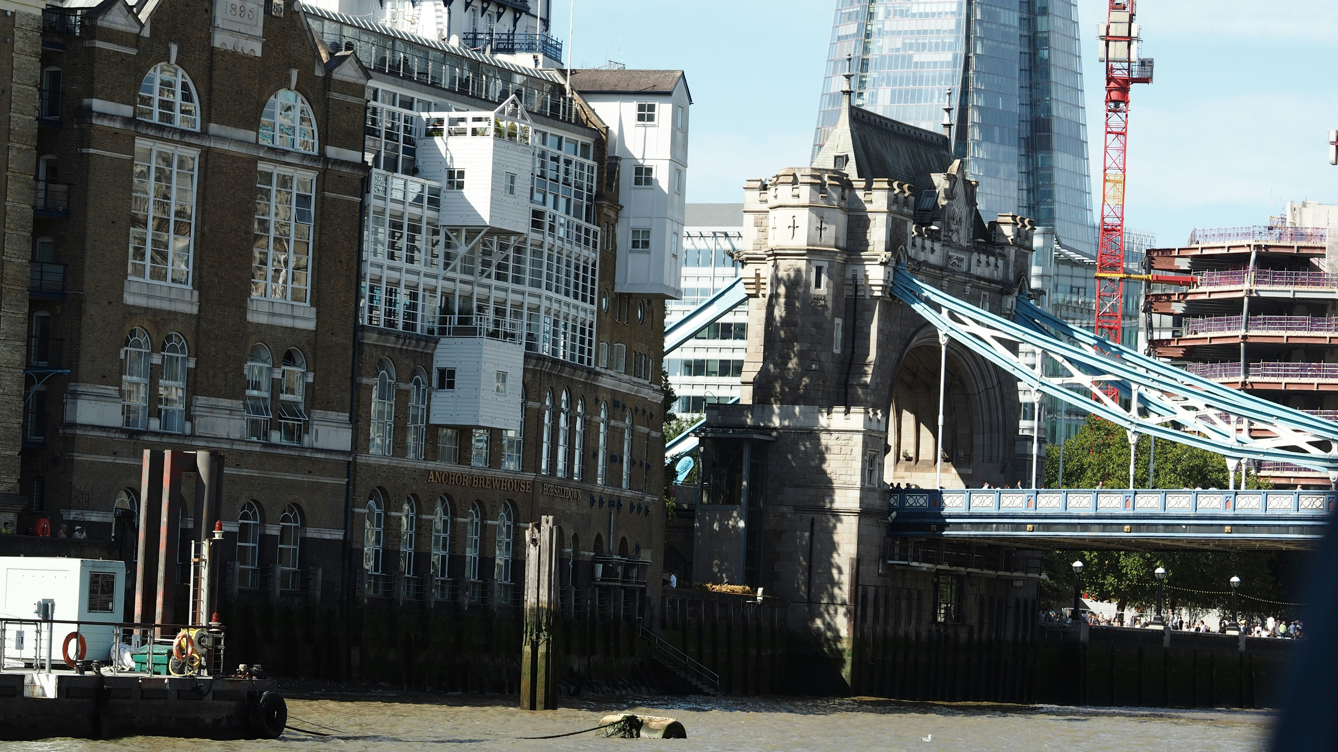 City Bridge Silhouette: Towering Structures Over the Thames