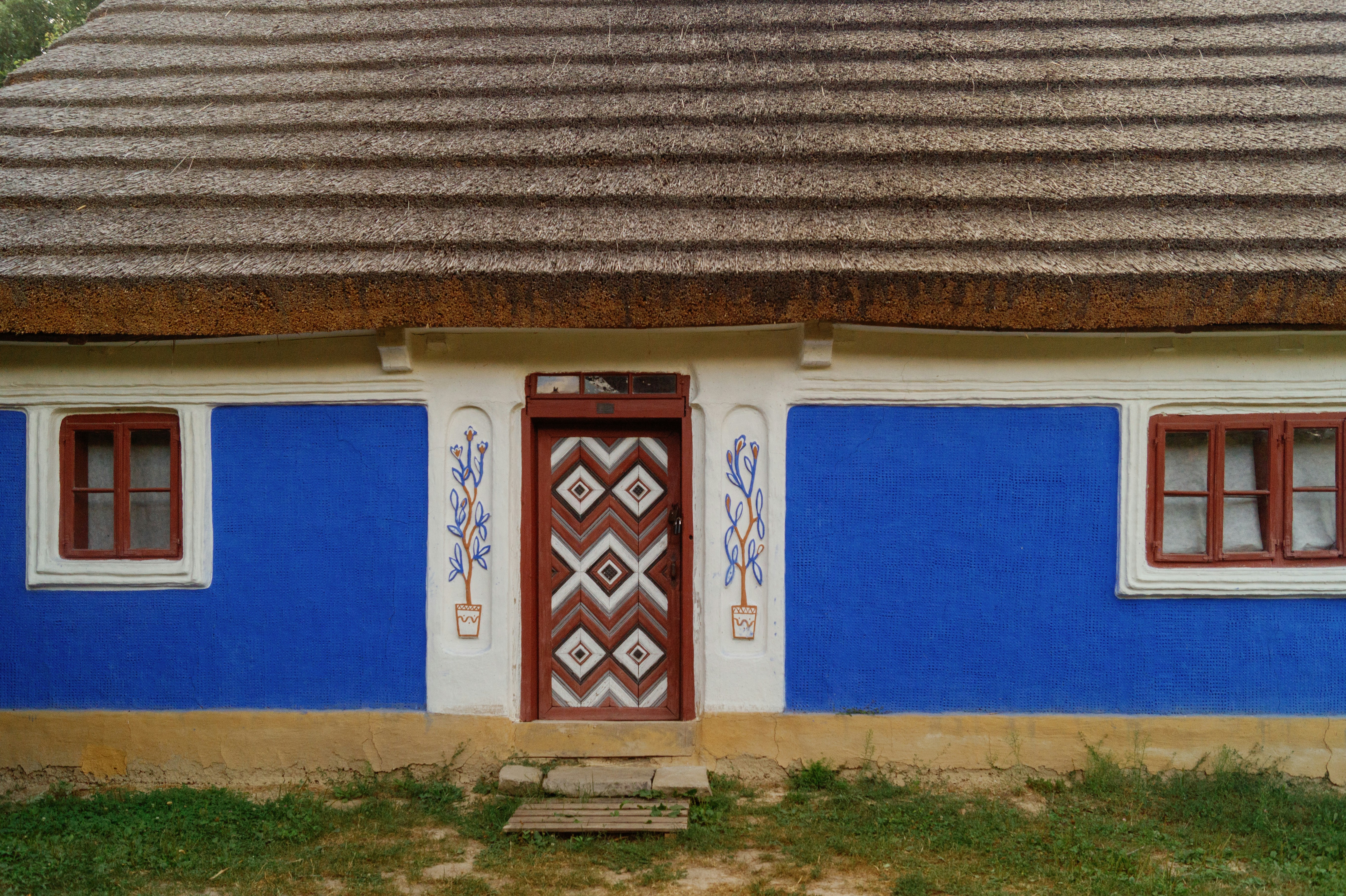 Azure Cottage Doorway on a Rustic Gable House