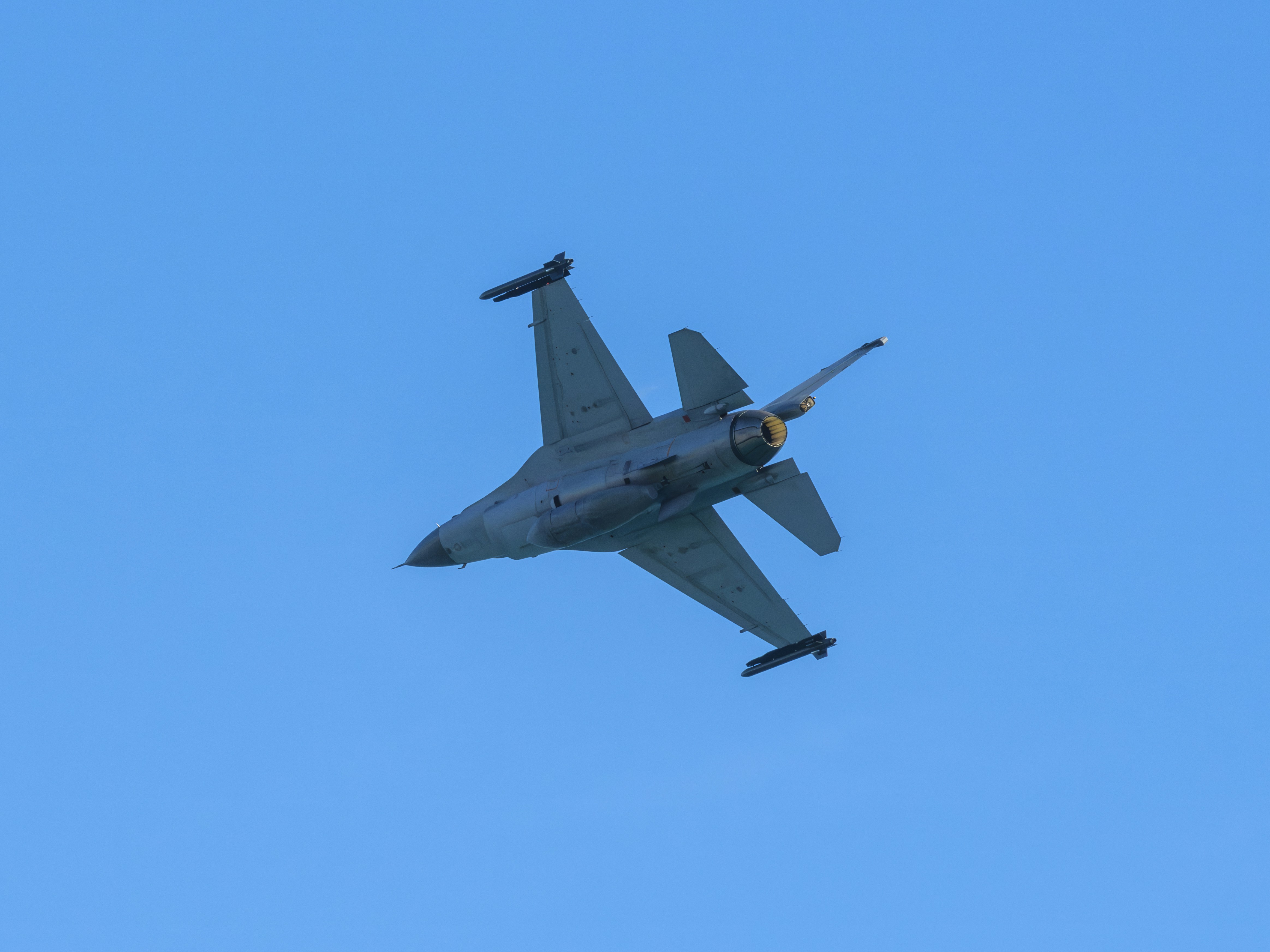 Sleek Thunder under a Pure Blue Sky