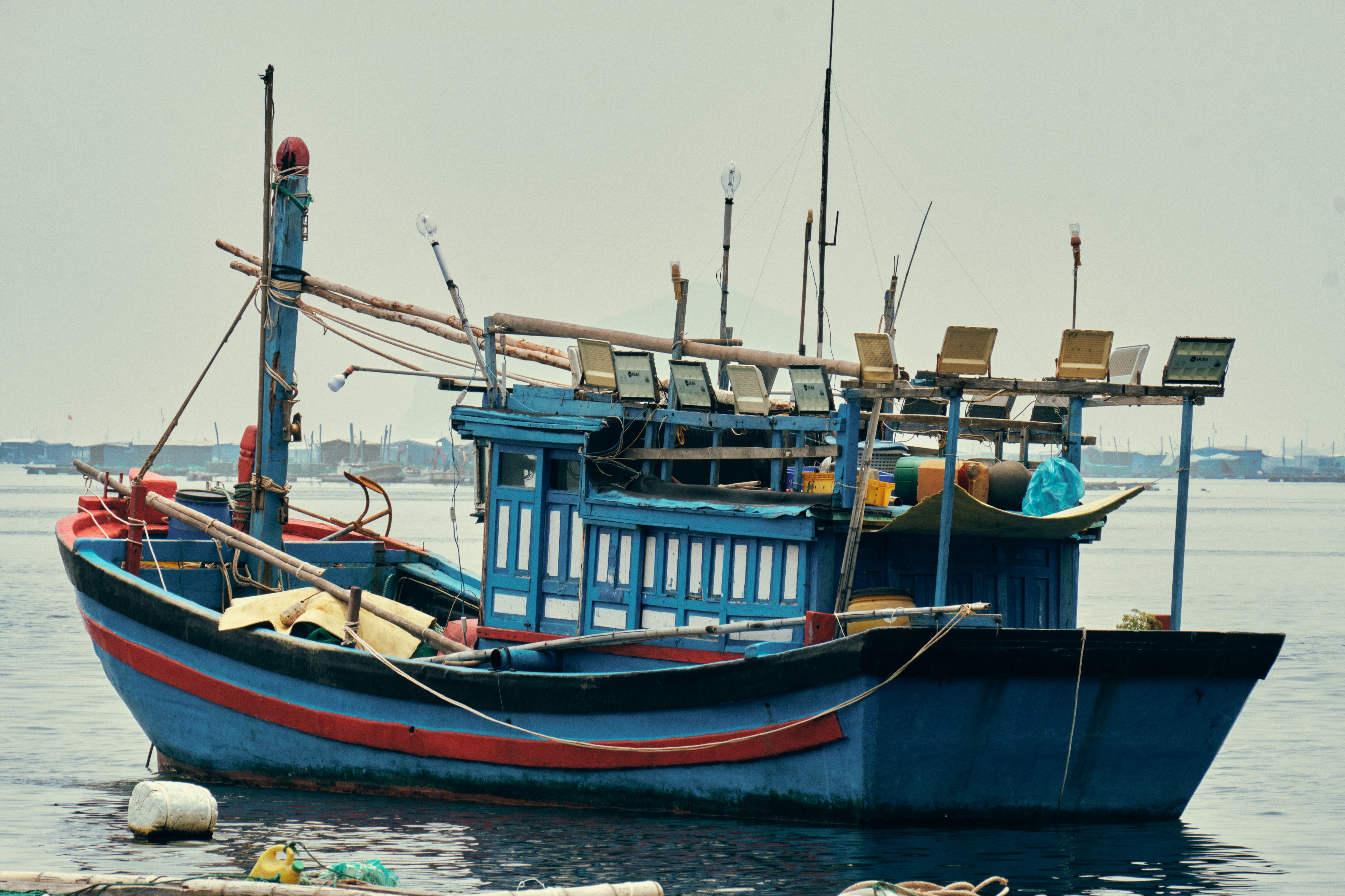 Blue Harborwork: A Sailor’s Cargo on Quiet Waters