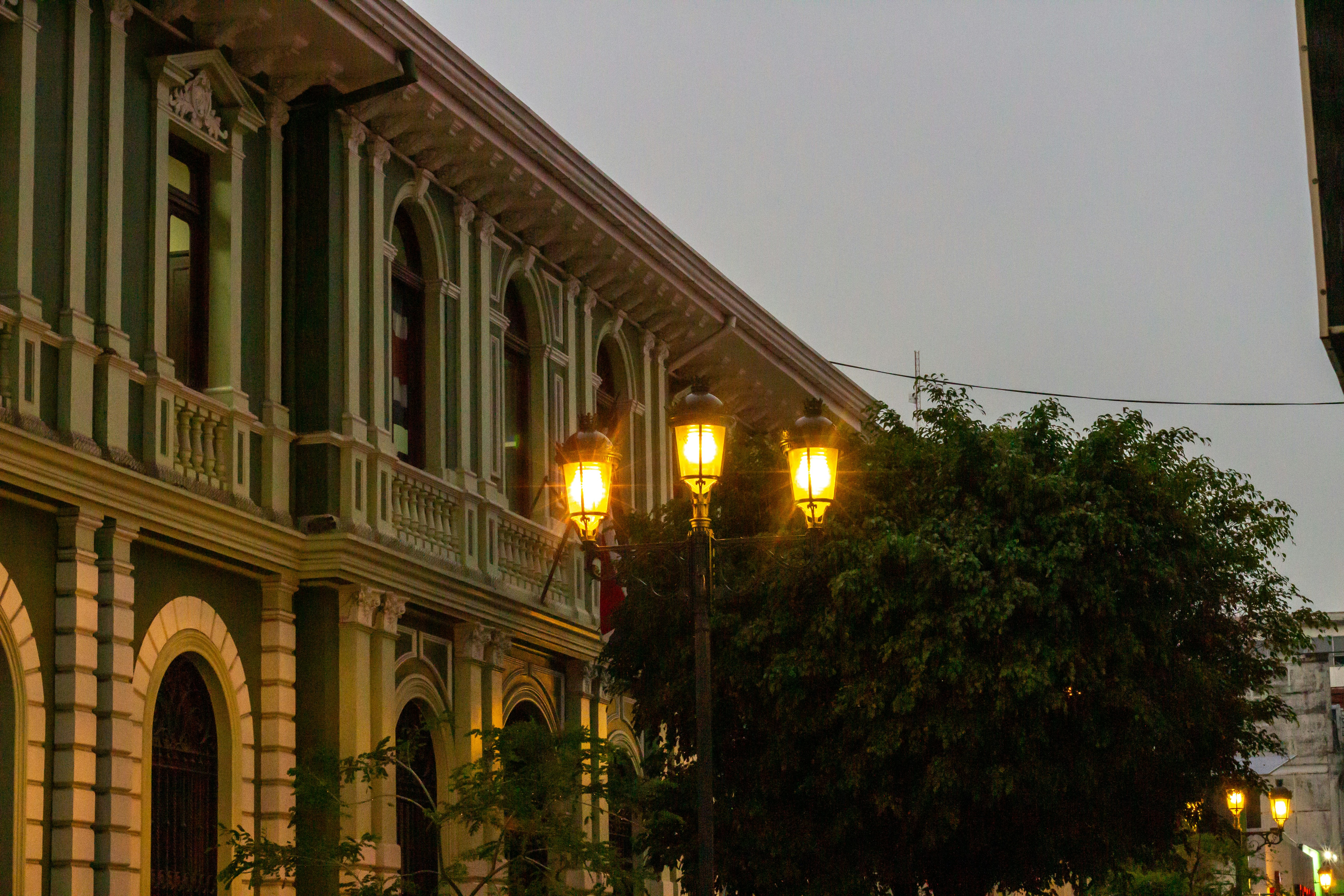 Terracotta Facade and Warm Streetlight Glow