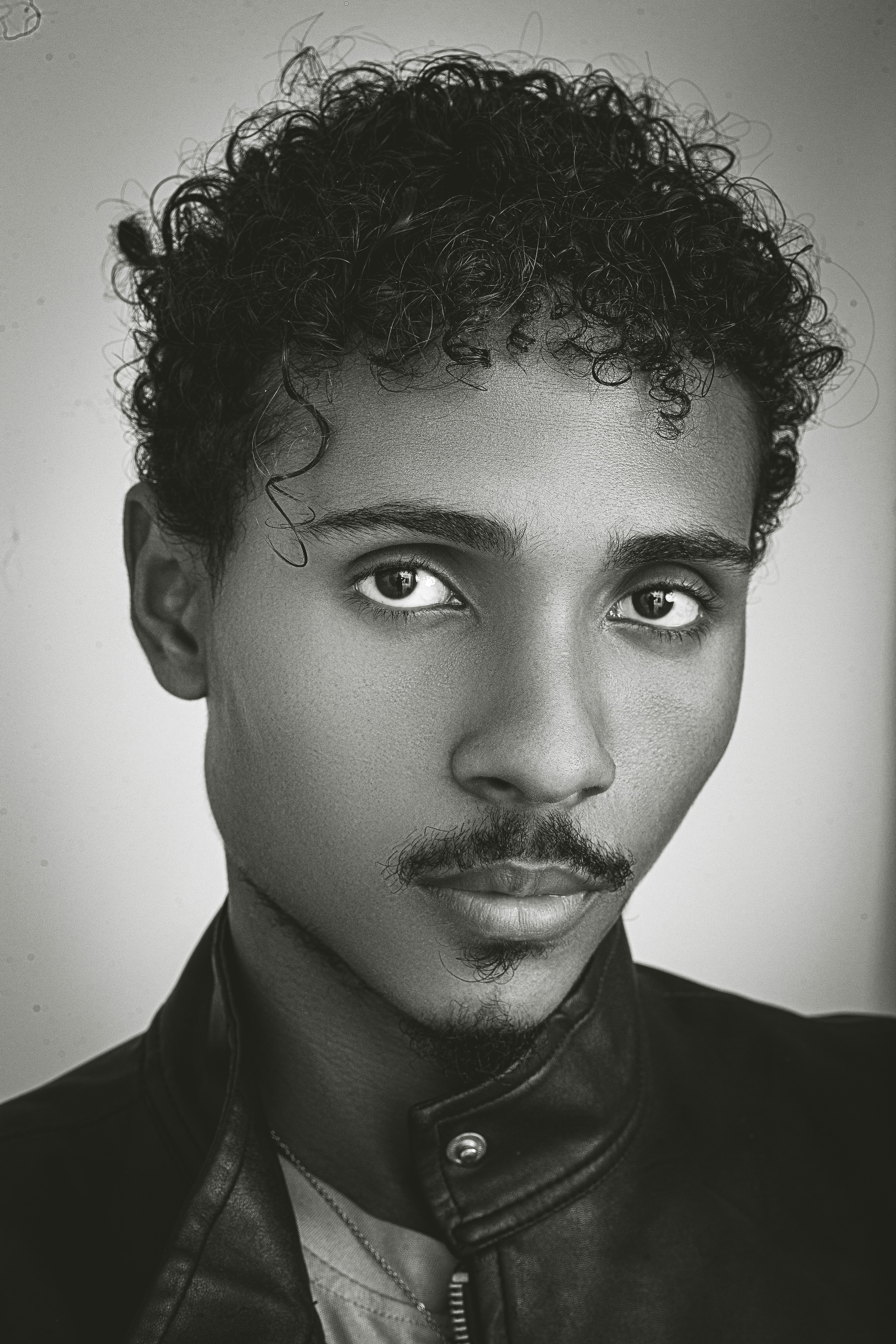 Midnight Portrait: A Quiet Gaze Through Soft Shadows
