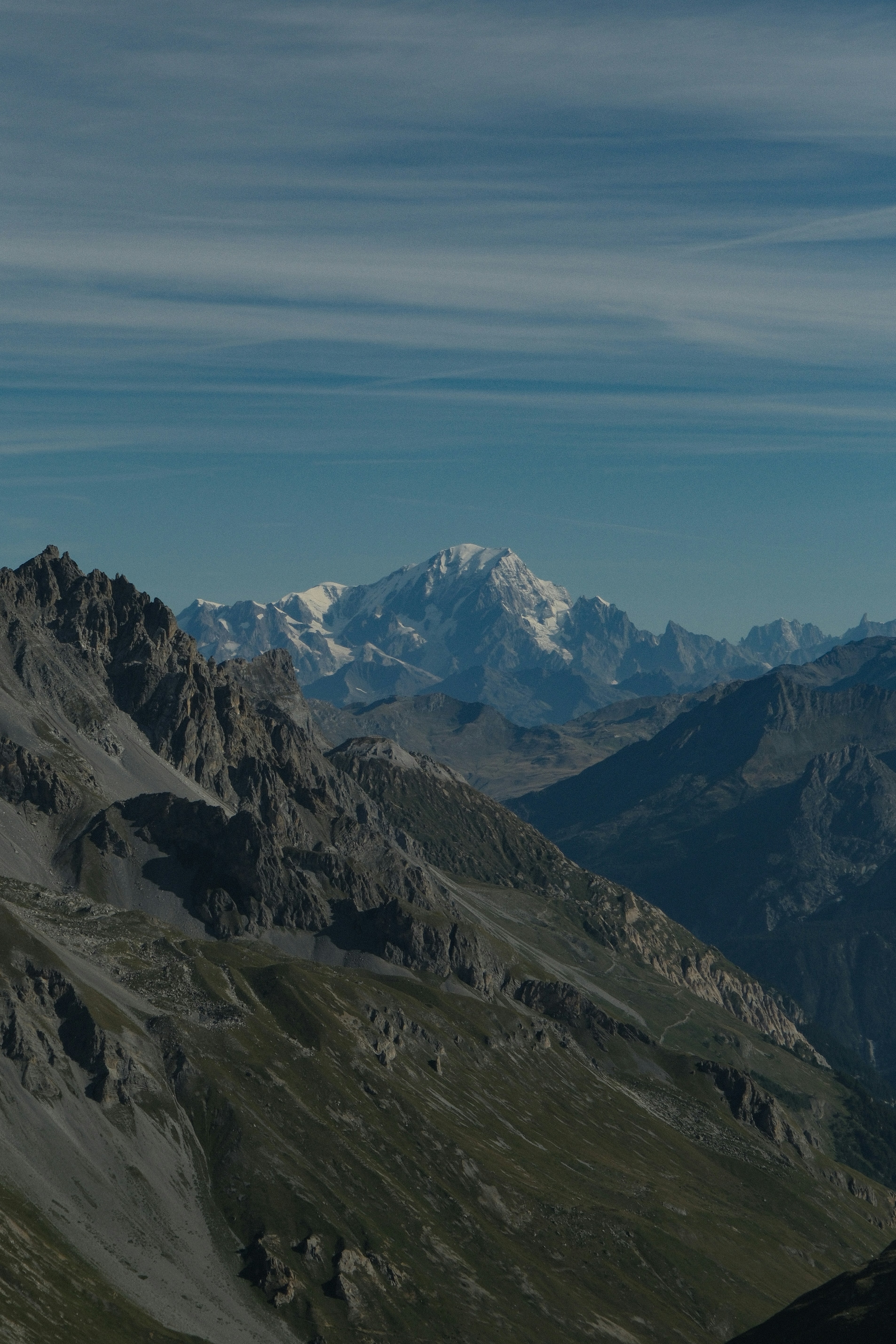 Snowcap Sentinel over the Craggy Spine