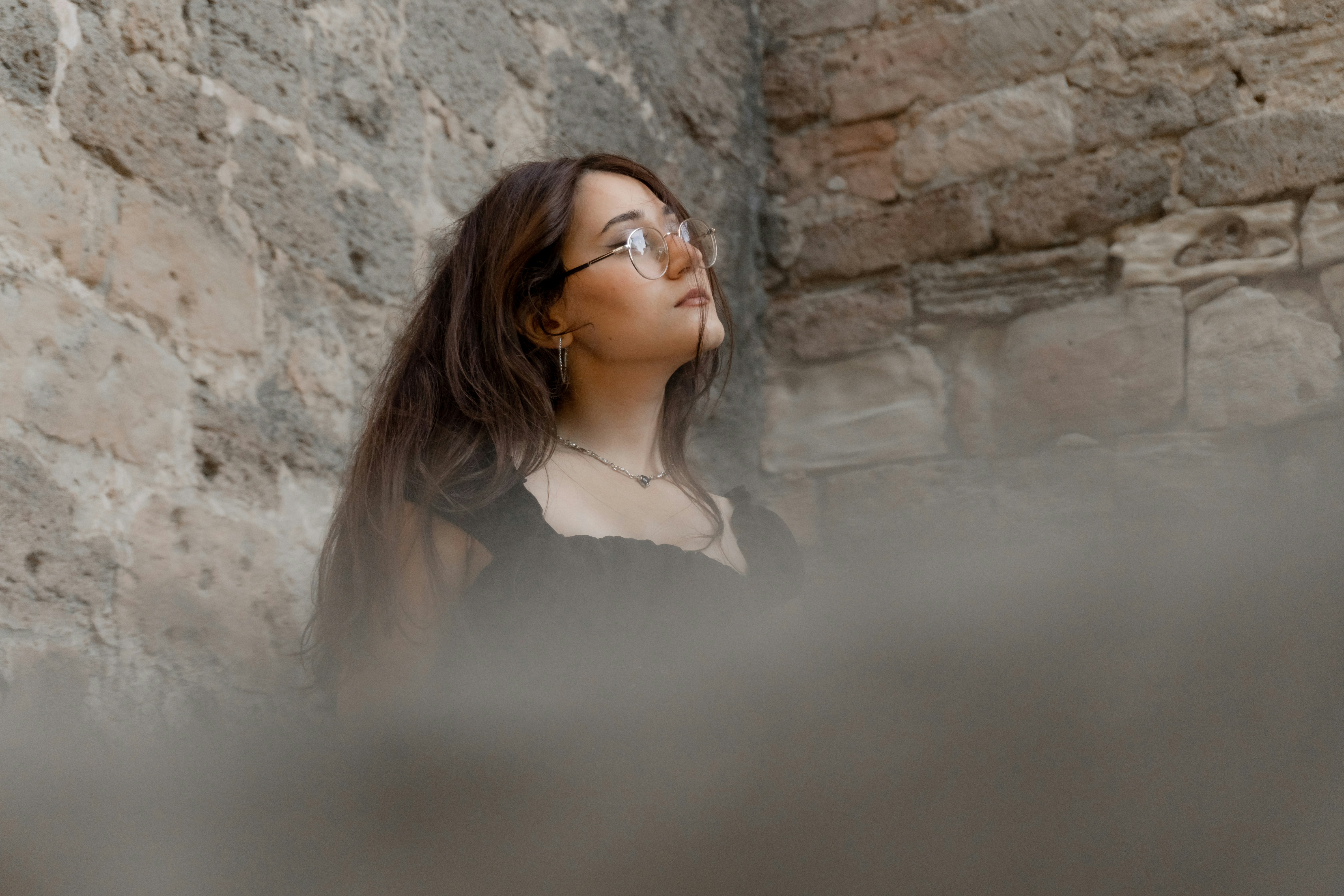Portrait in the Ruins: Quiet Confidence Beneath the Overhang
