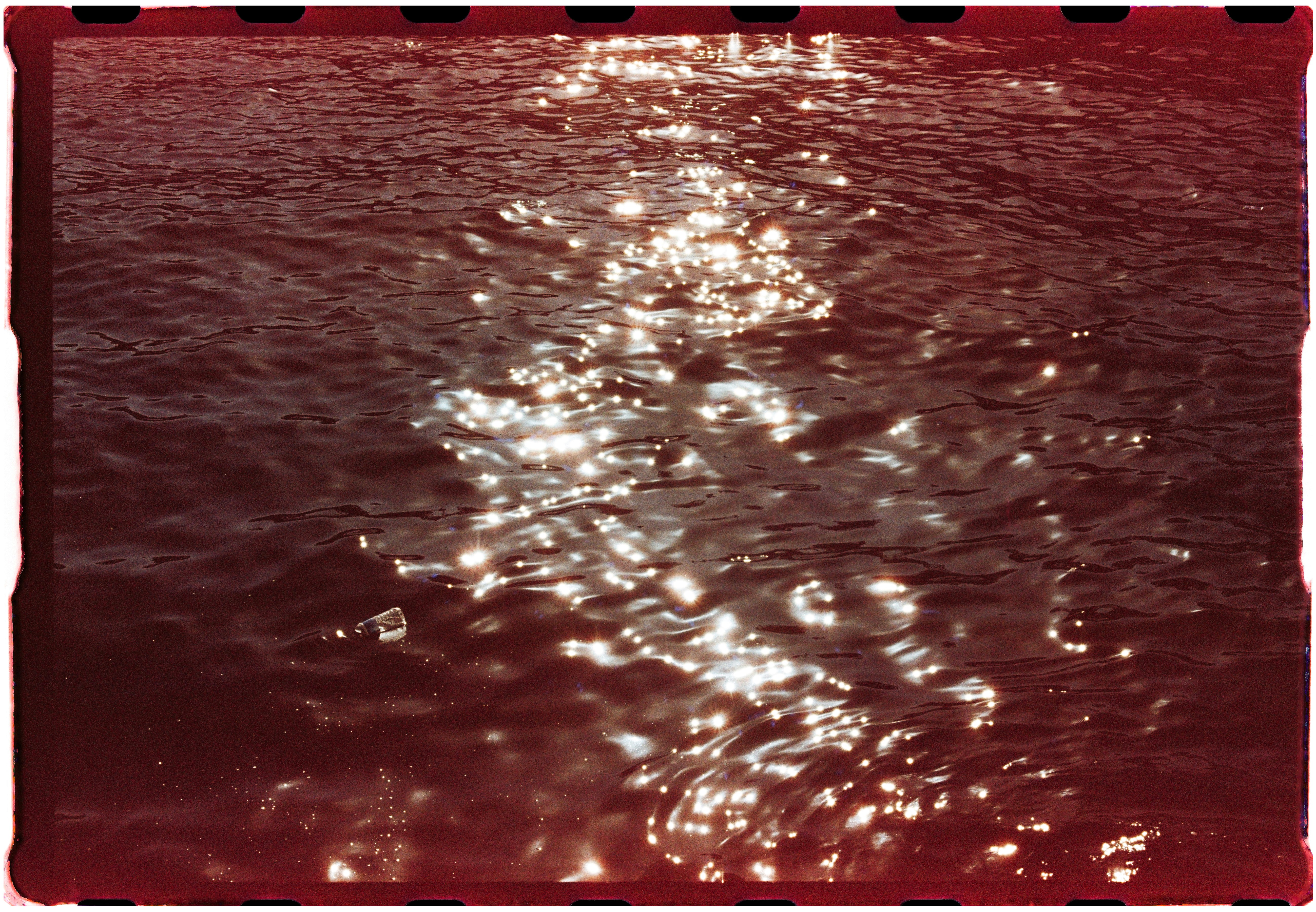 Glinting Wave Path: Sunset Light on Ripples