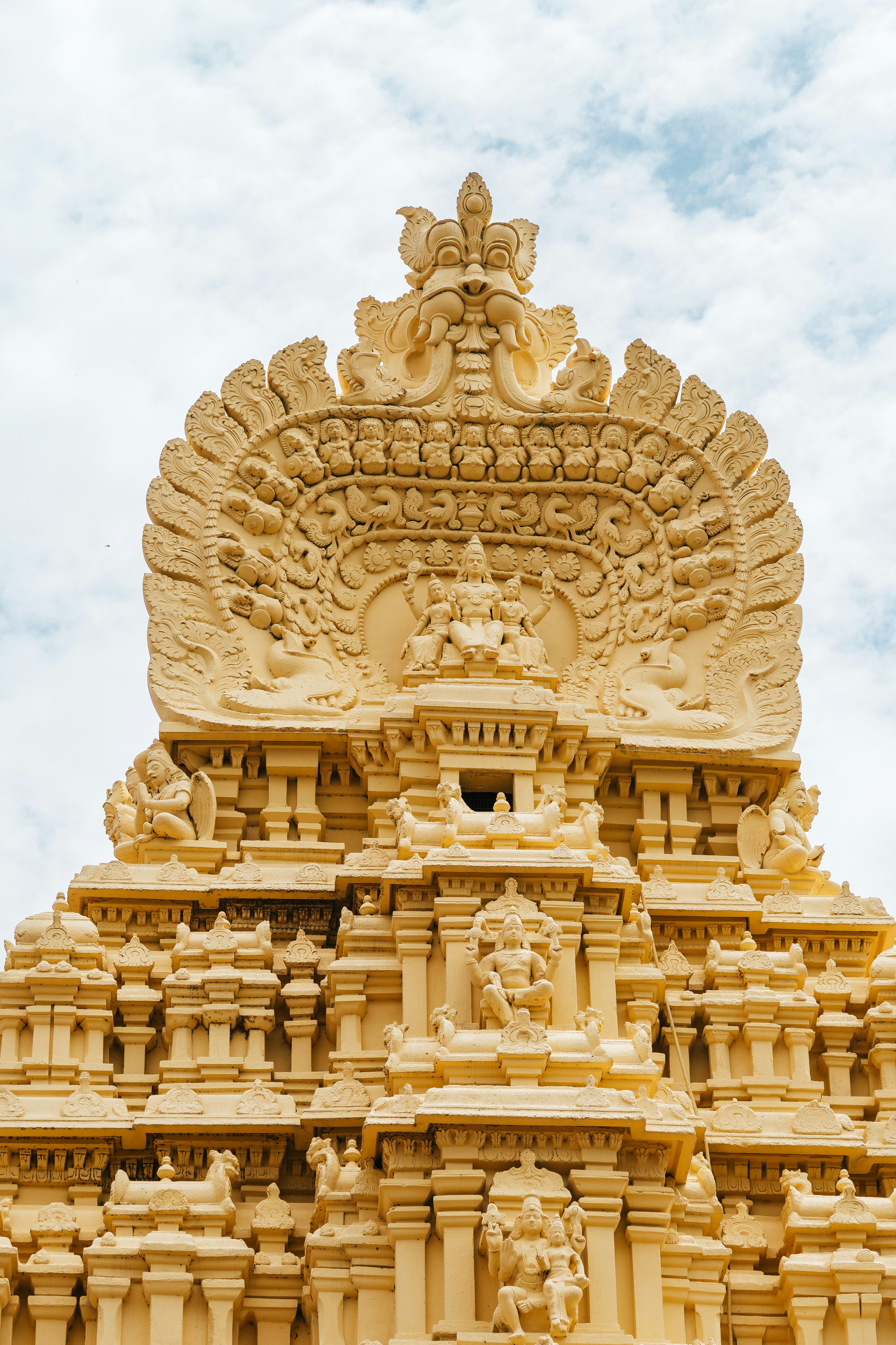 Sacred Carved Dawn: An Indian Temple Gopuram Reaching Toward the Sky