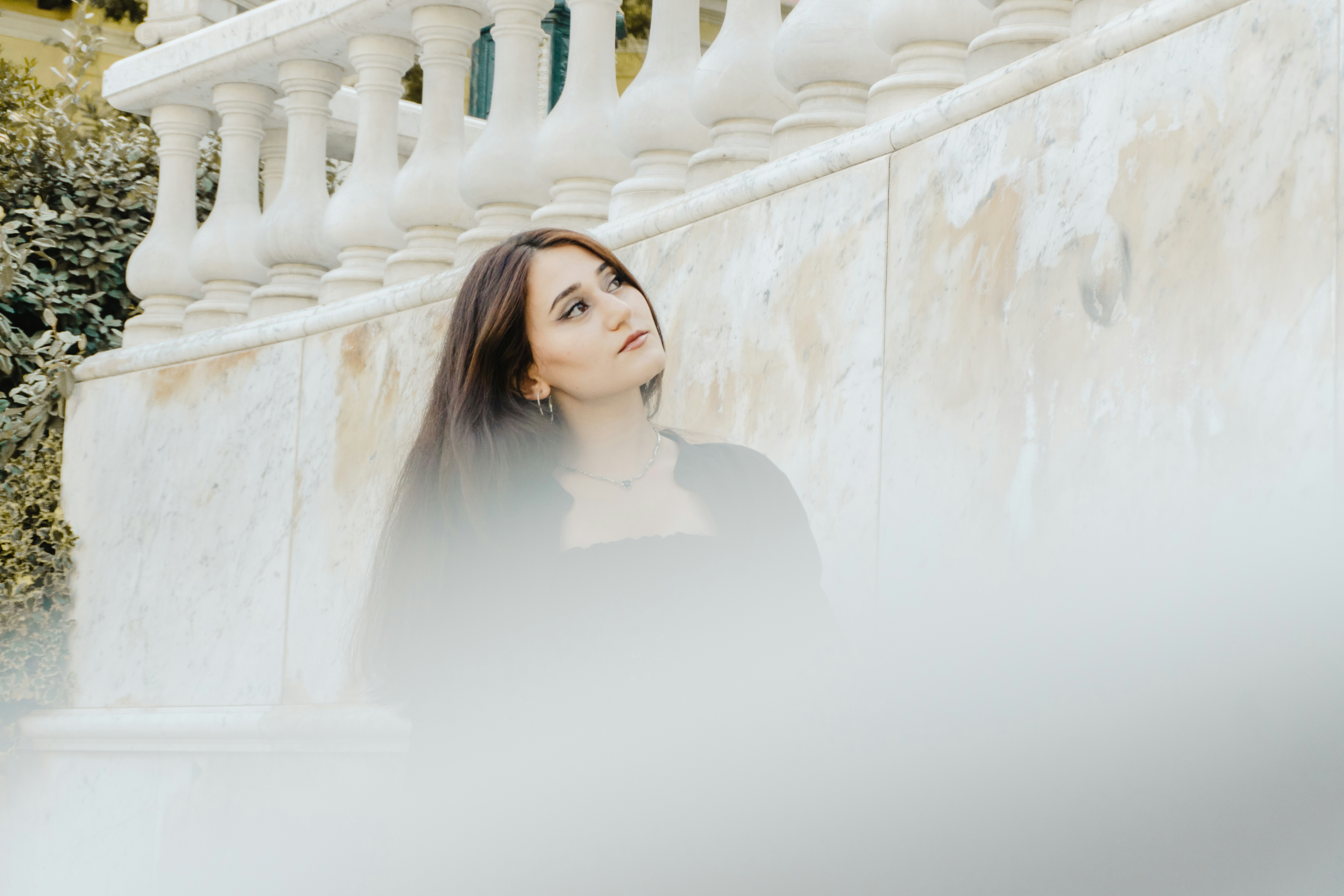 Soft Gaze Above Marble Walls