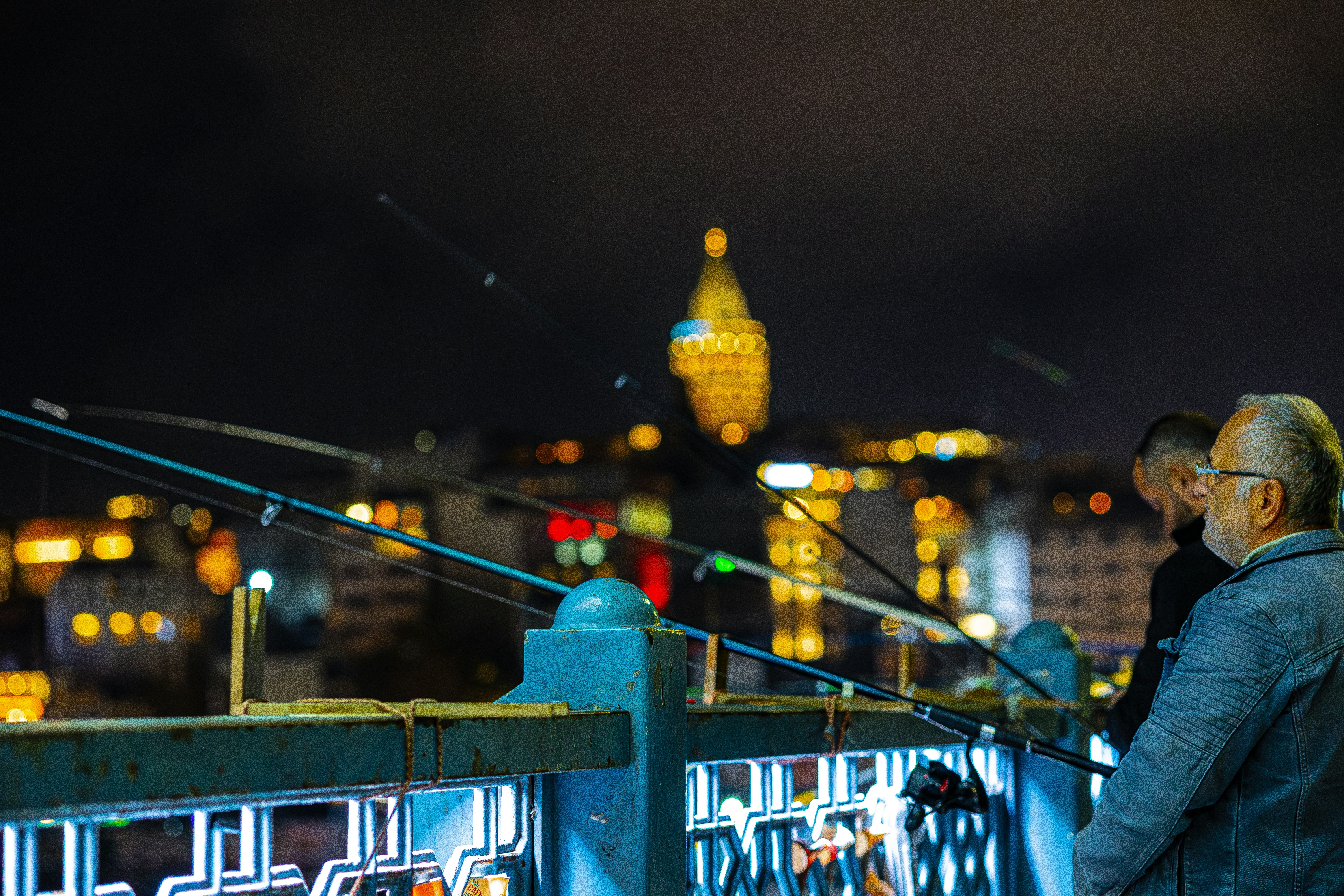 Rooftop Night: Fishermen of Light on a City Edge