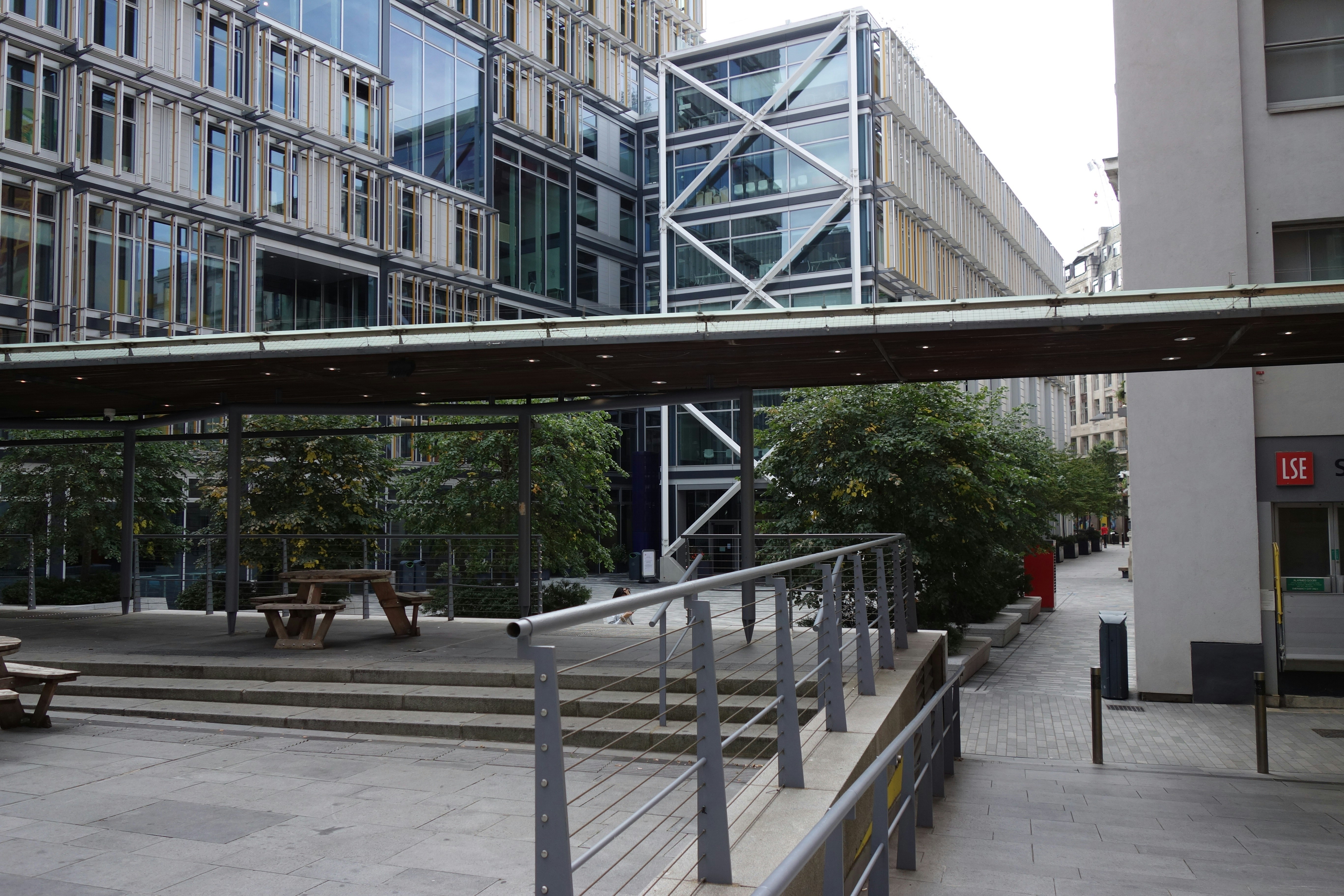 Urban Walkway Overhang: A Quiet Corridor Between Glass Towers