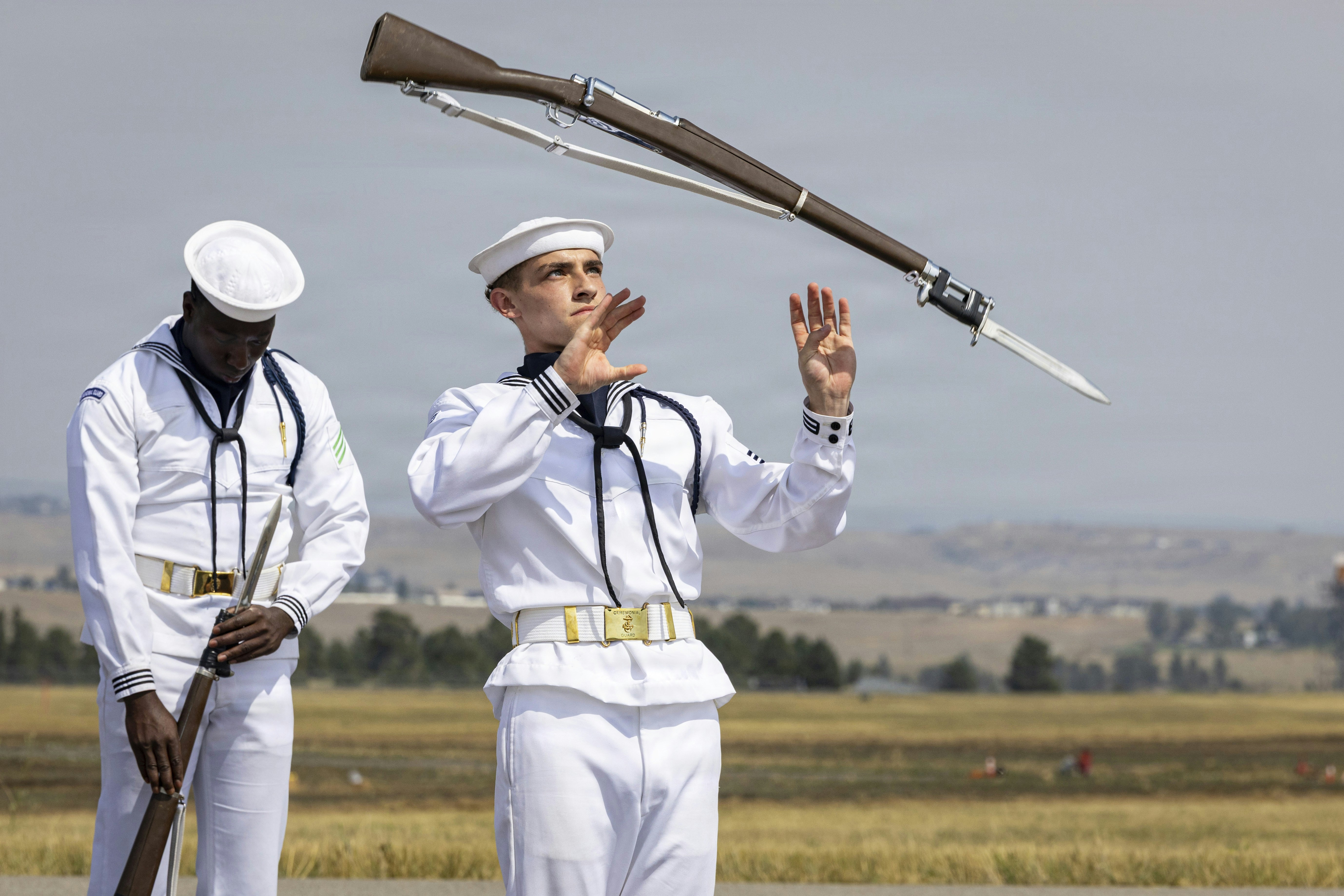 U.S. Navy Hospitalman Mike Martinez, assigned to the U.S. Navy Ceremonial Guard, performs rifle drill during Billings Navy Week at the Yellowstone International Airshow, Aug. 22, 2026. Billings Navy Week is the eighth of 12 Navy Weeks taking place in 2026 as part of the Navy Office of Community Outreach’s “Road Trip to 250,” a nationwide effort supporting America's 250th birthday, Freedom 250. Navy Weeks bring a variety of assets, equipment, and personnel to a single city for a weeklong series of engagements designed to connect communities across America with their Navy, highlighting shared history and the enduring commitment to defending freedom and supporting the nation’s independence. (U.S. Navy photo by Mass Communication Specialist 1st Class Matt Hall)