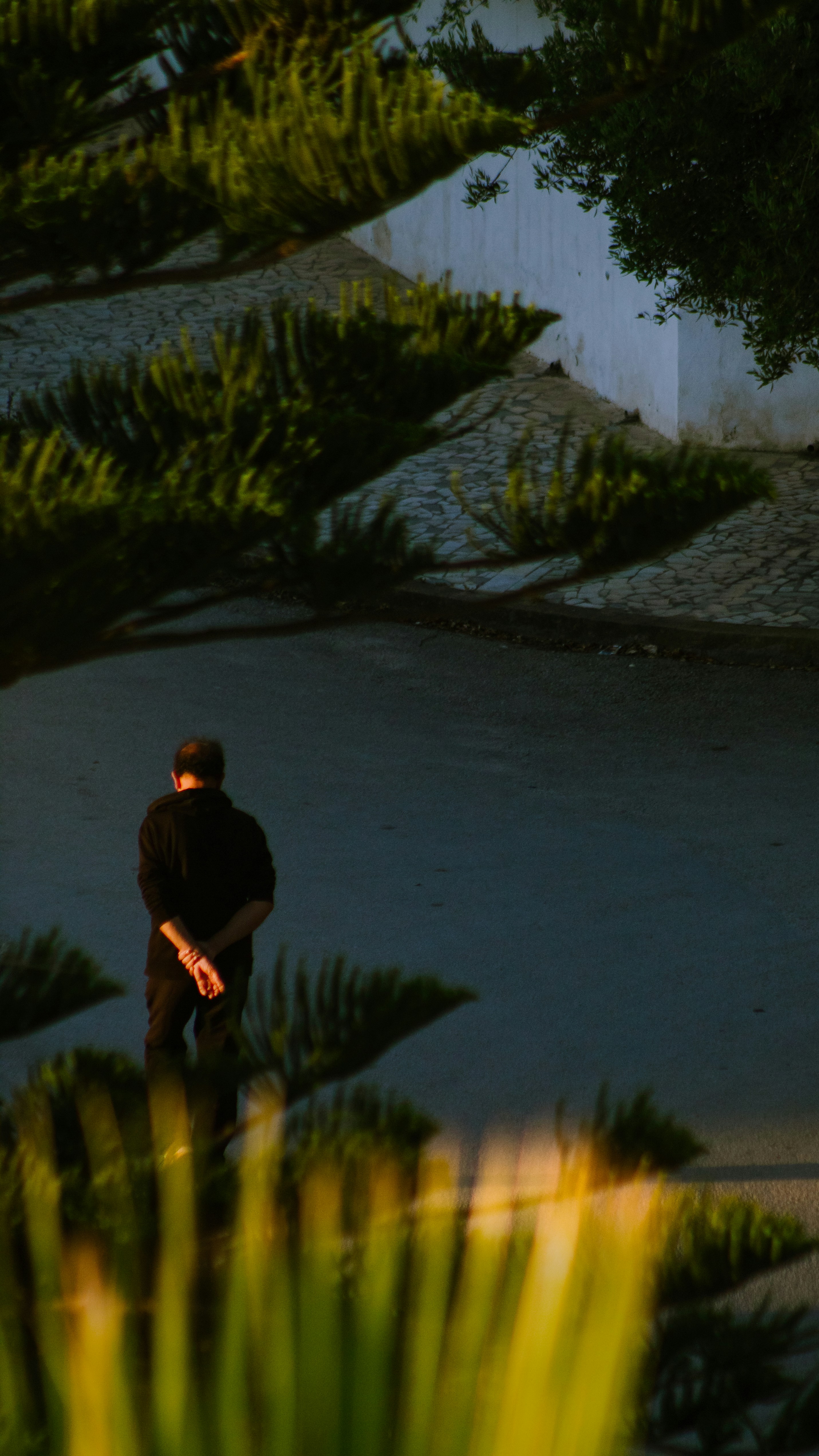 Silent Apnea: A Man in Shadowed Urban Quiet