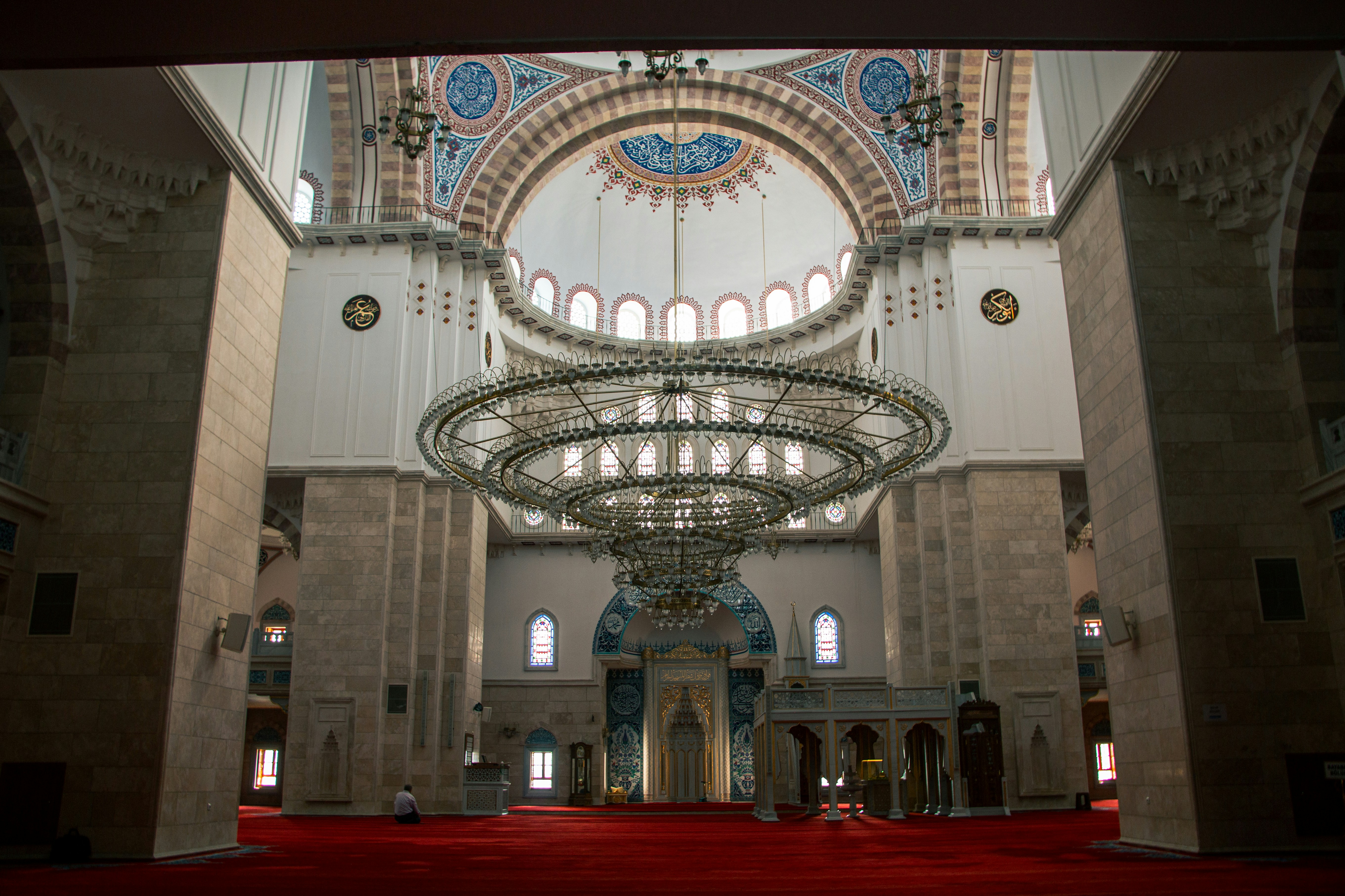 Inside the Grand Dome: A Sacred Quiet Under Circling Chandeliers
