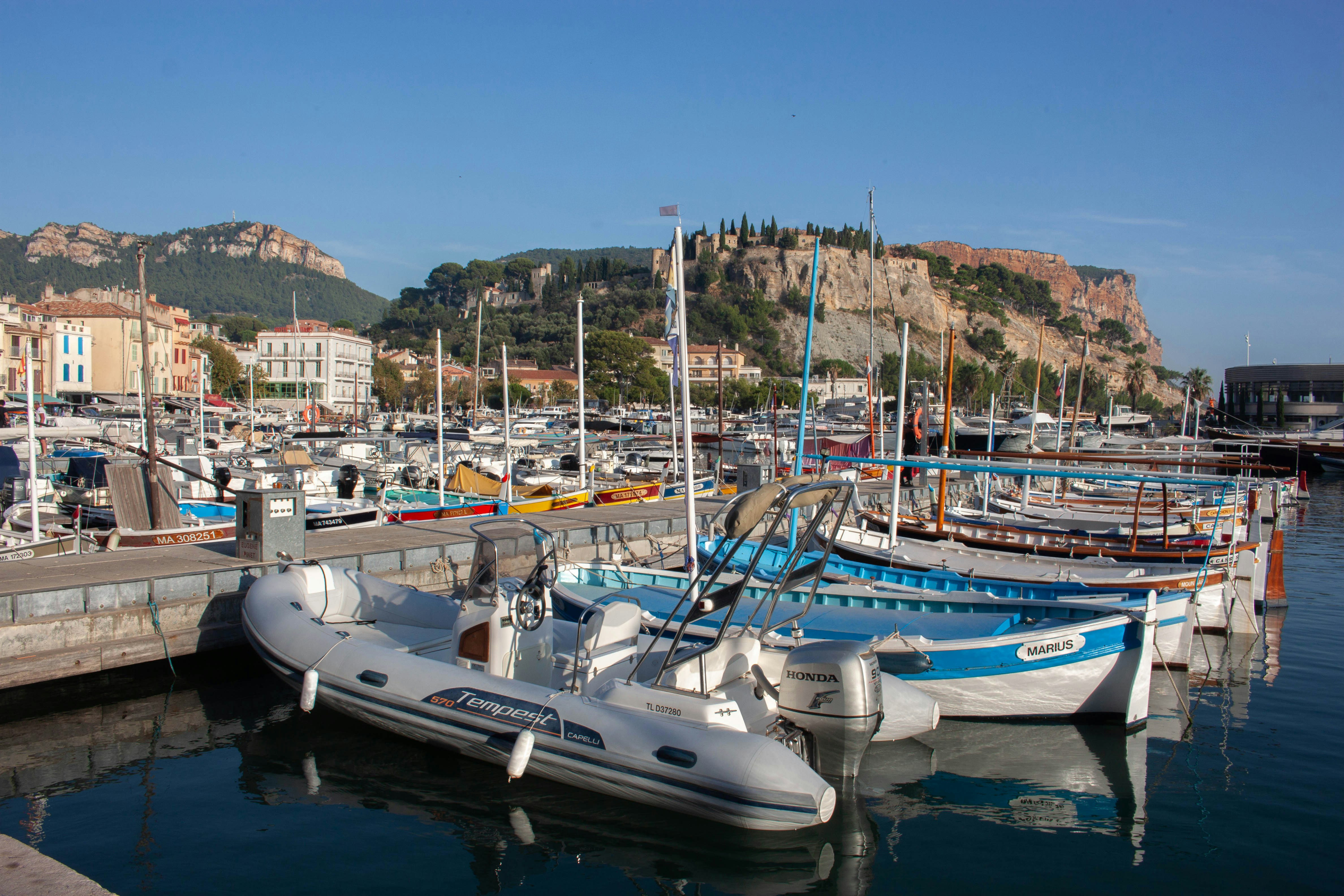 Harbor Studio: A Fleet of Angled Boats Docked at a Mediterranean Marina