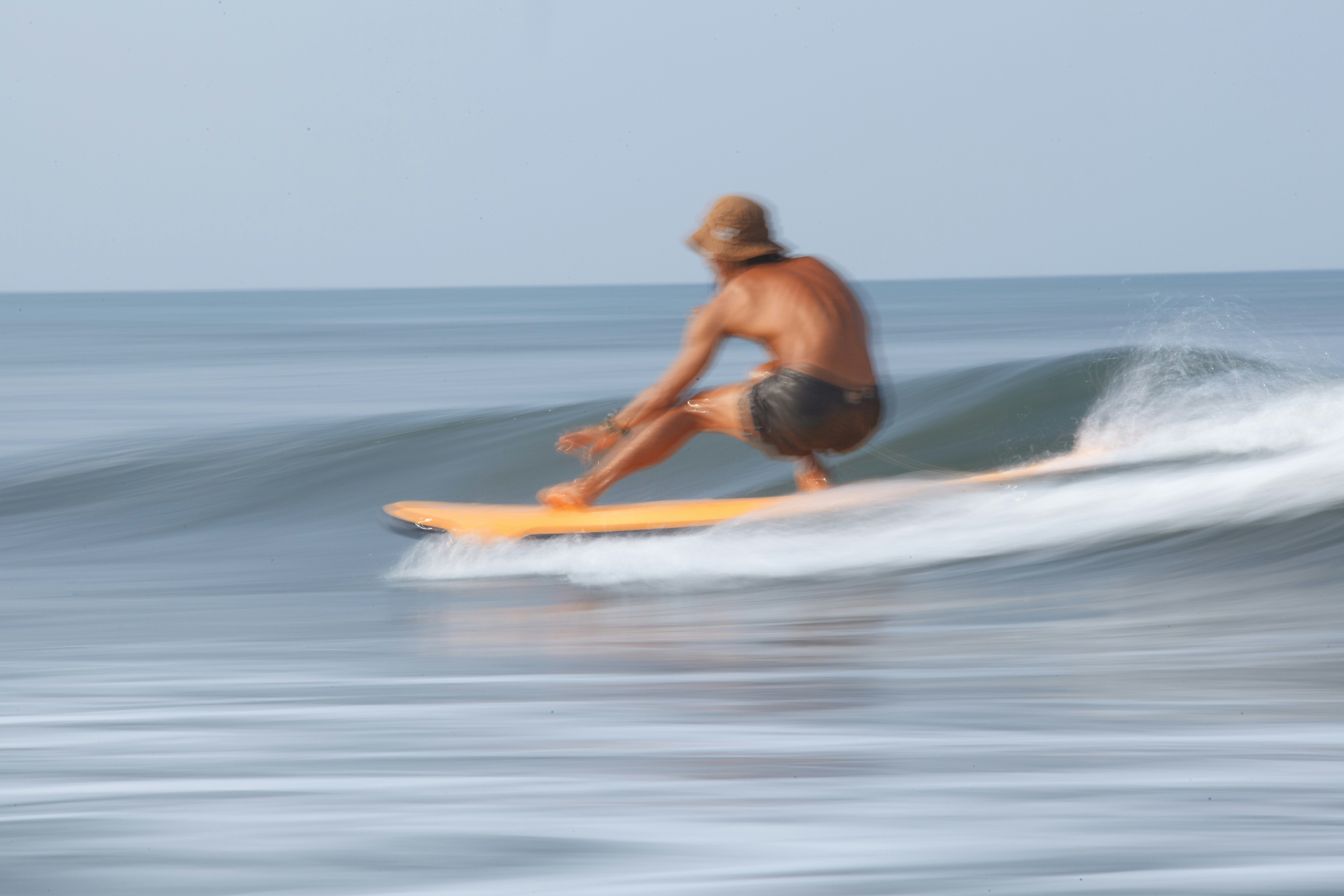 Rider in Motion: A Golden Wave Sprinting Across the Crest