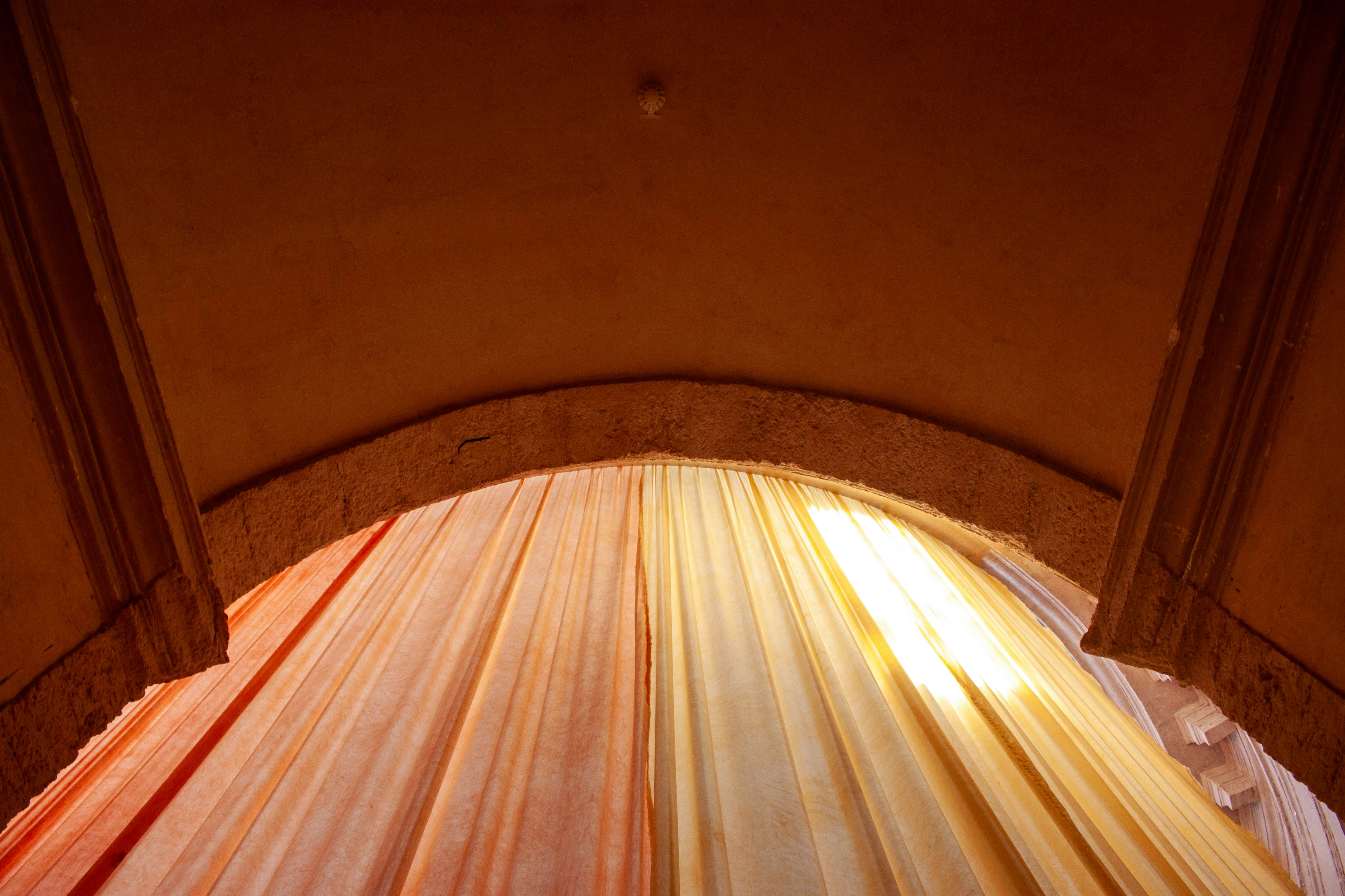 Curtained Archway: A Vivid Toward the Light