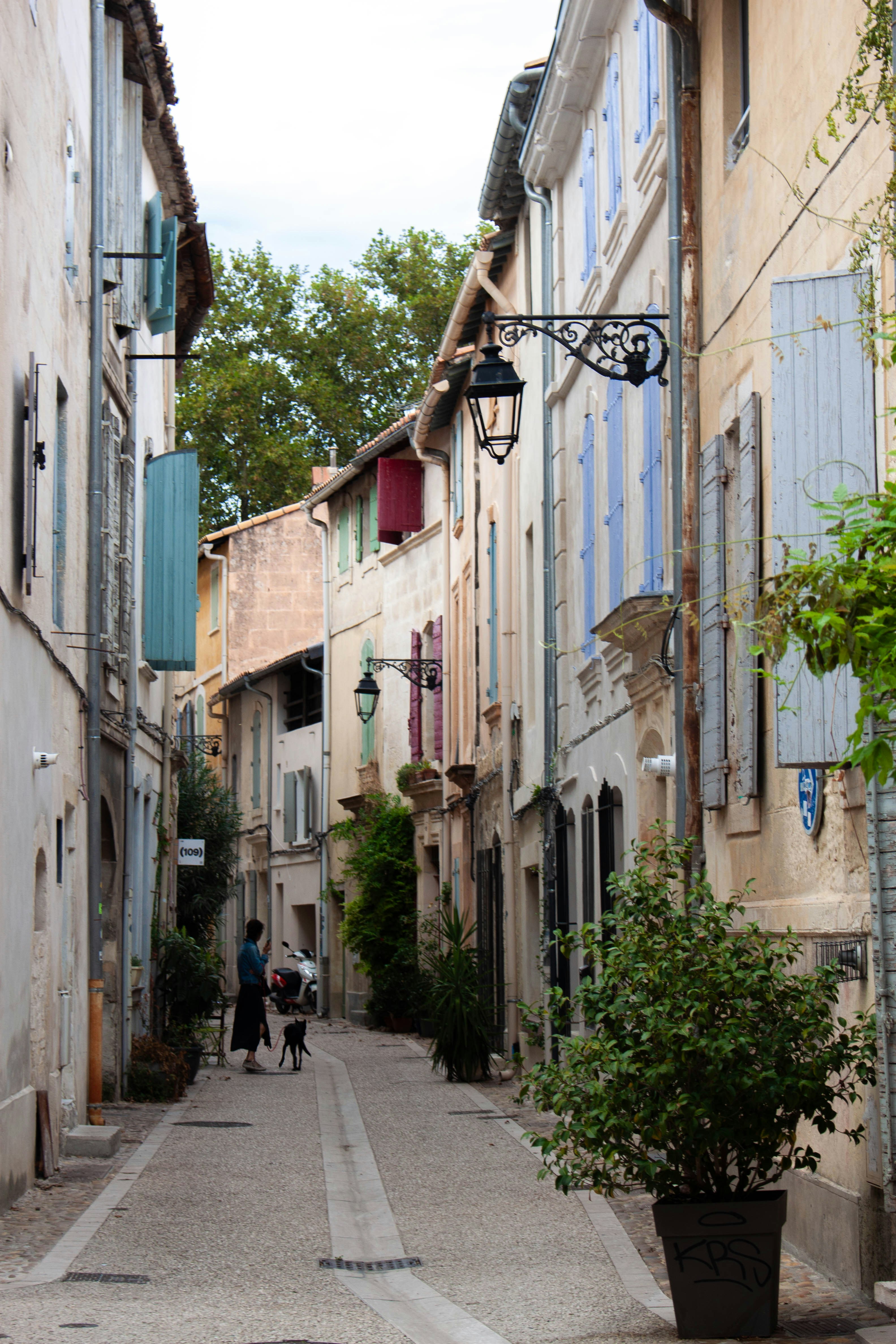 Narrow Provençal Lane: Laundry Lines and Lanterns Guiding the Way