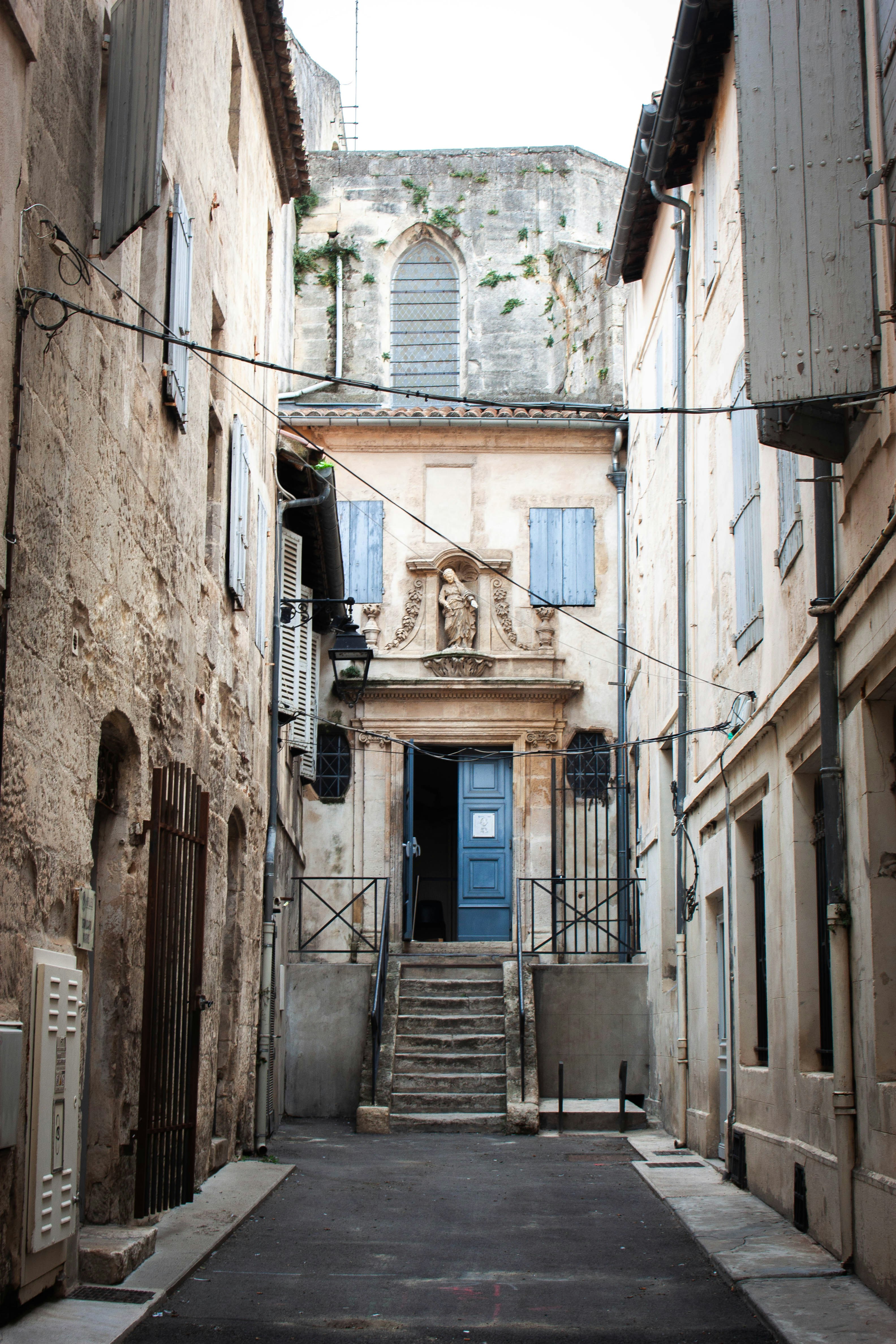 Blue Door at the End of a Stone Alley