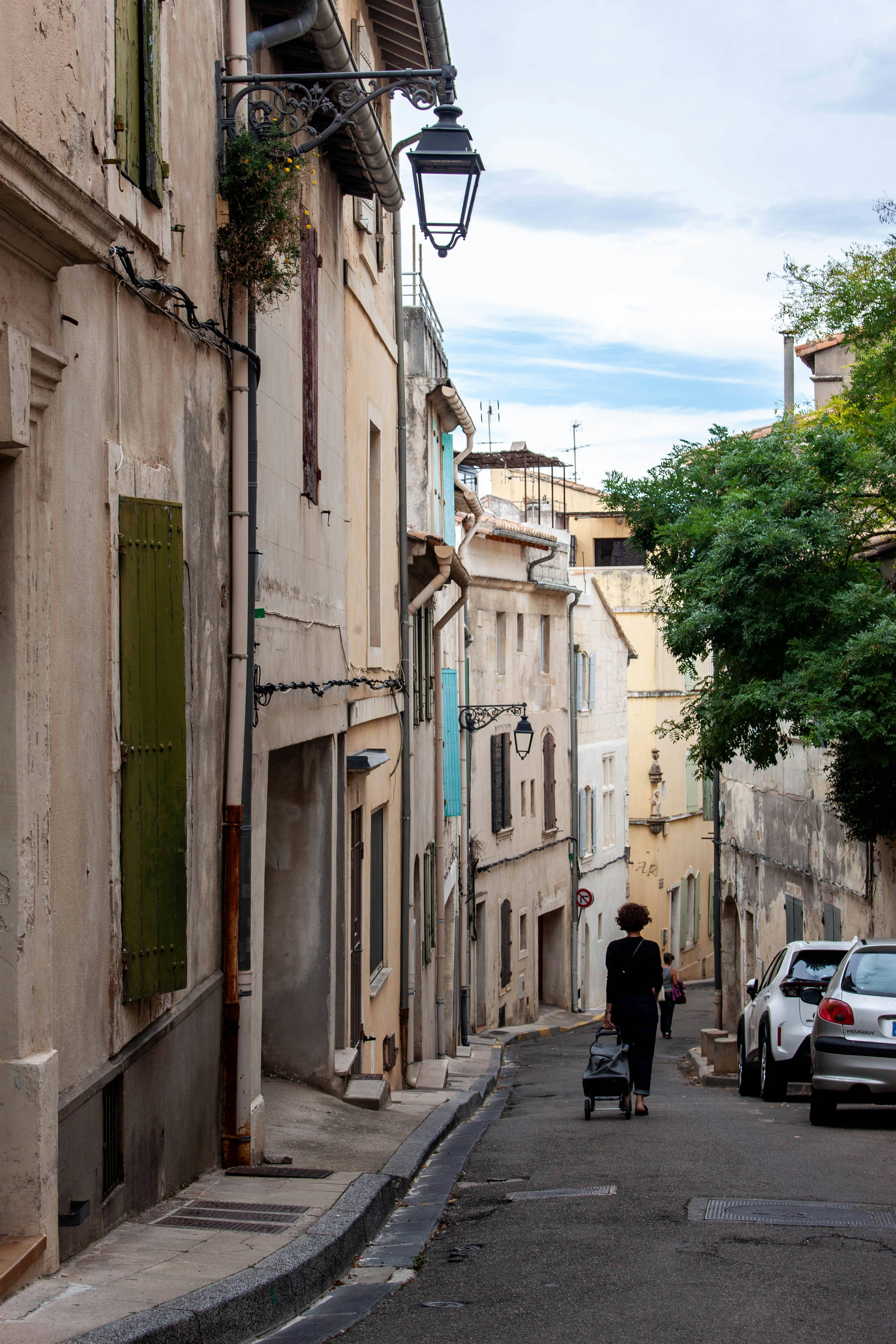 A Quiet Stroll Through a Sunlit European Alley