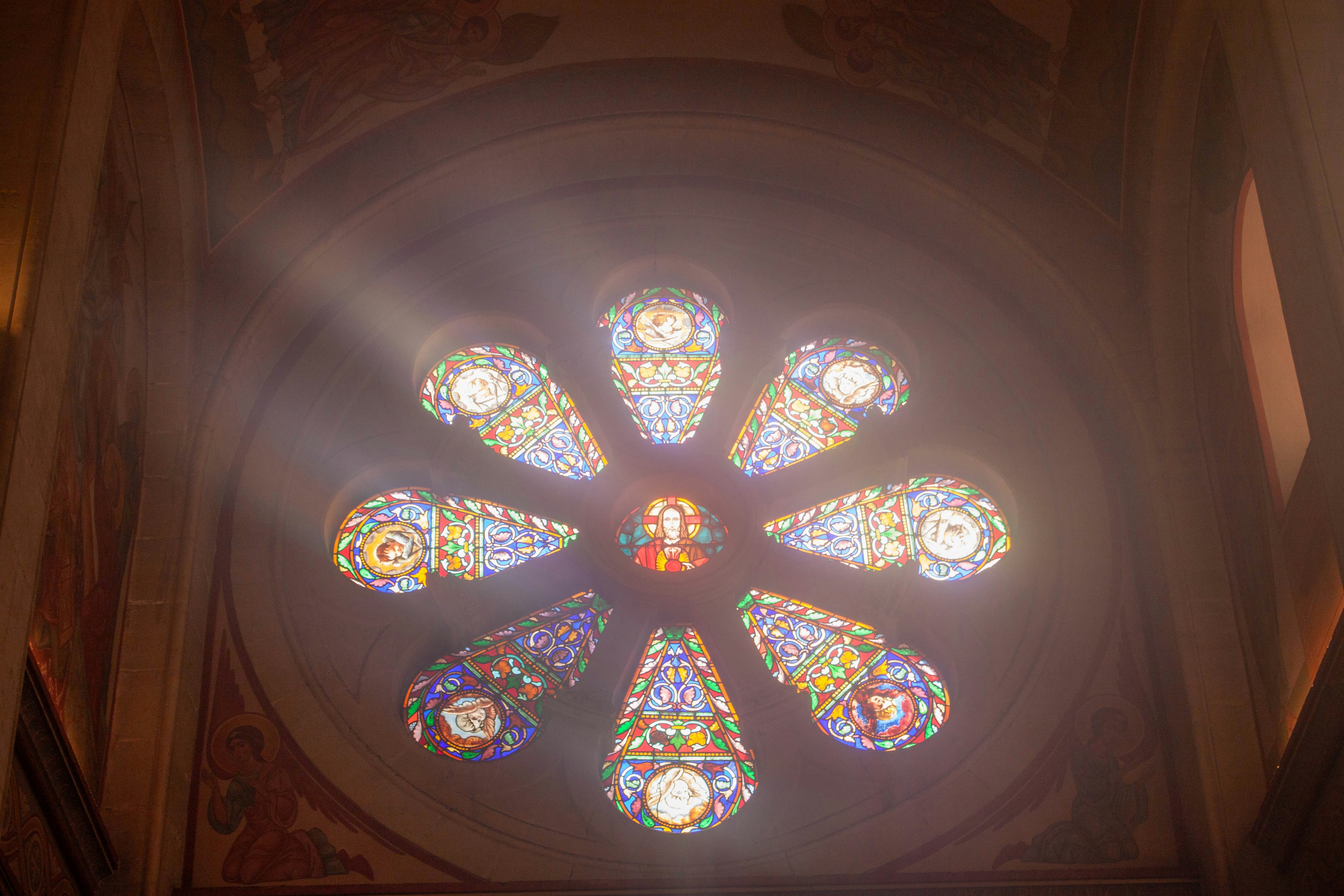 Circular Rose Window of Stained Glass Emitting Soft Cathedral Light