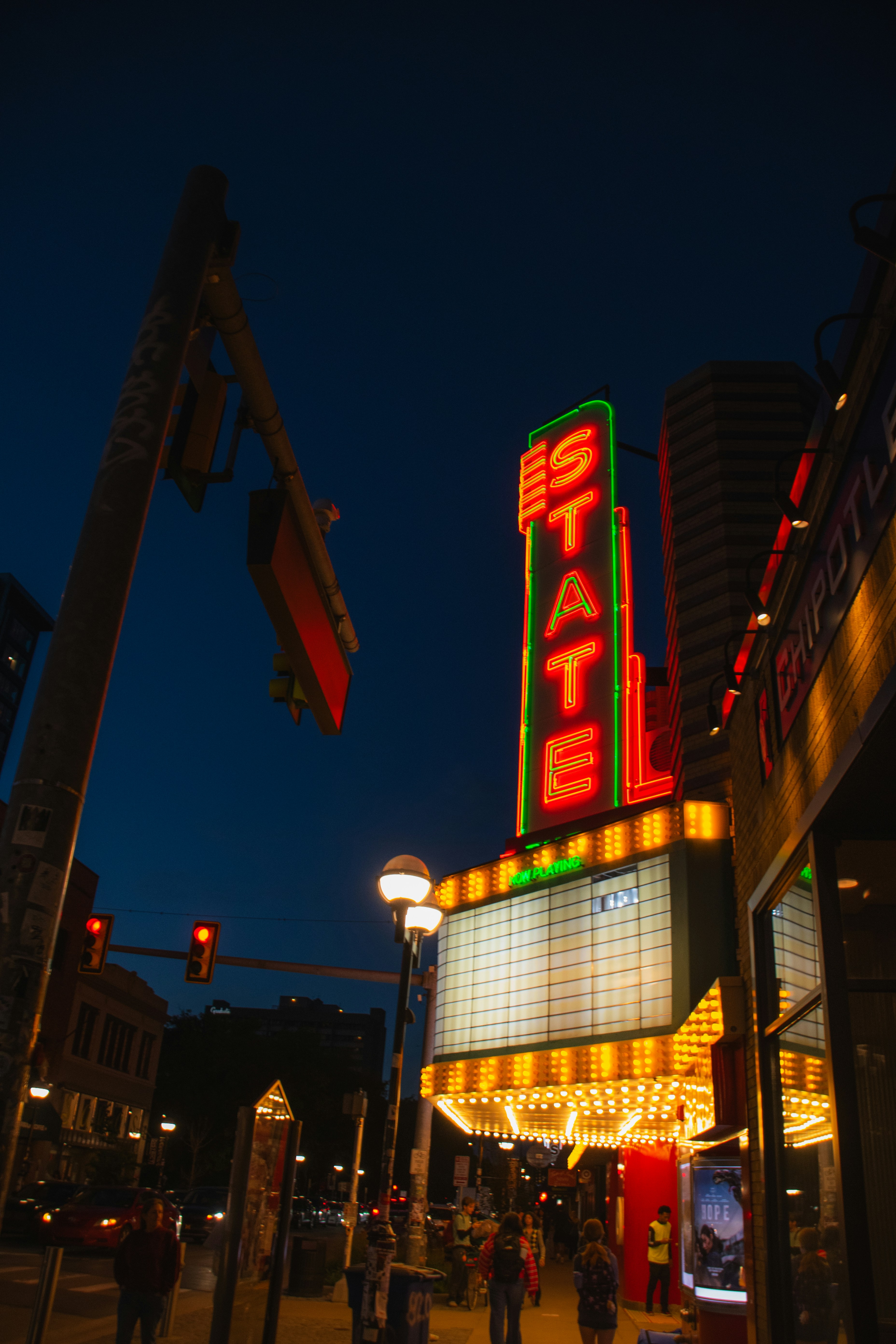 Neon Signage on a Busy Night: The Spirit of Downtown Lights