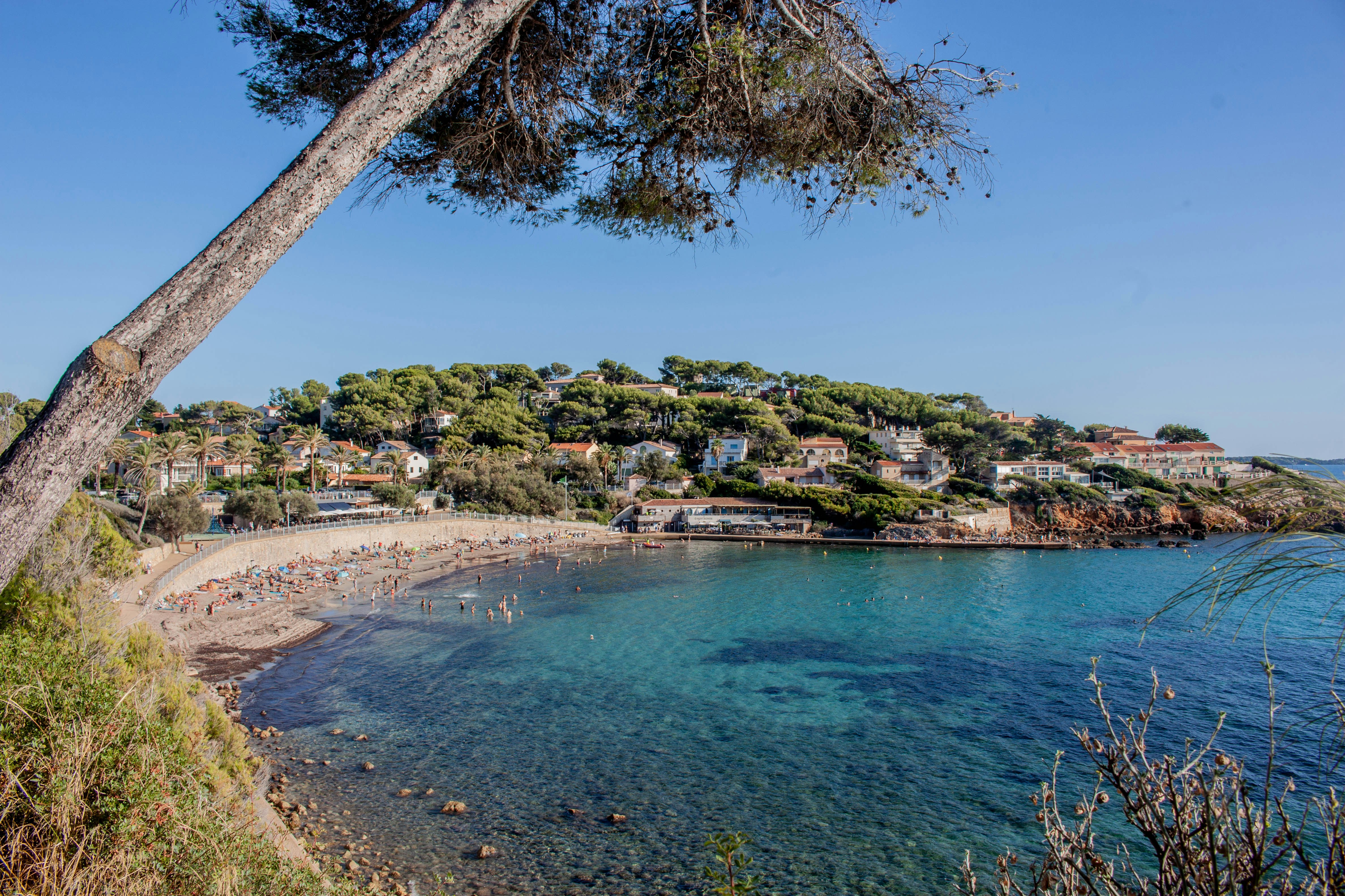 Azure Cove Village: A Sunlit Coastal Balcony Overlook