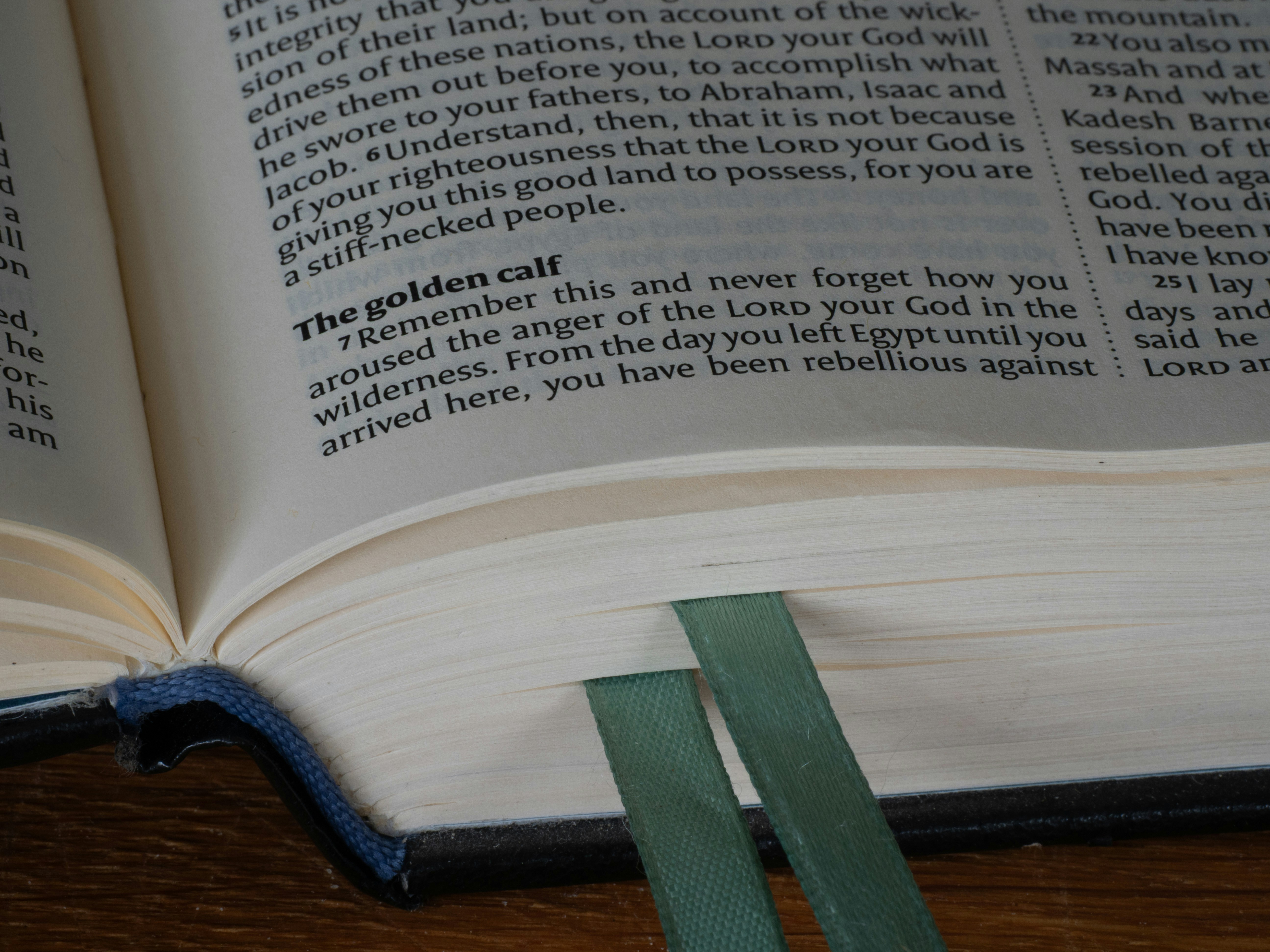 Hardcover Edge: A Folded Spine and a Teal Ribbon Play About Promise