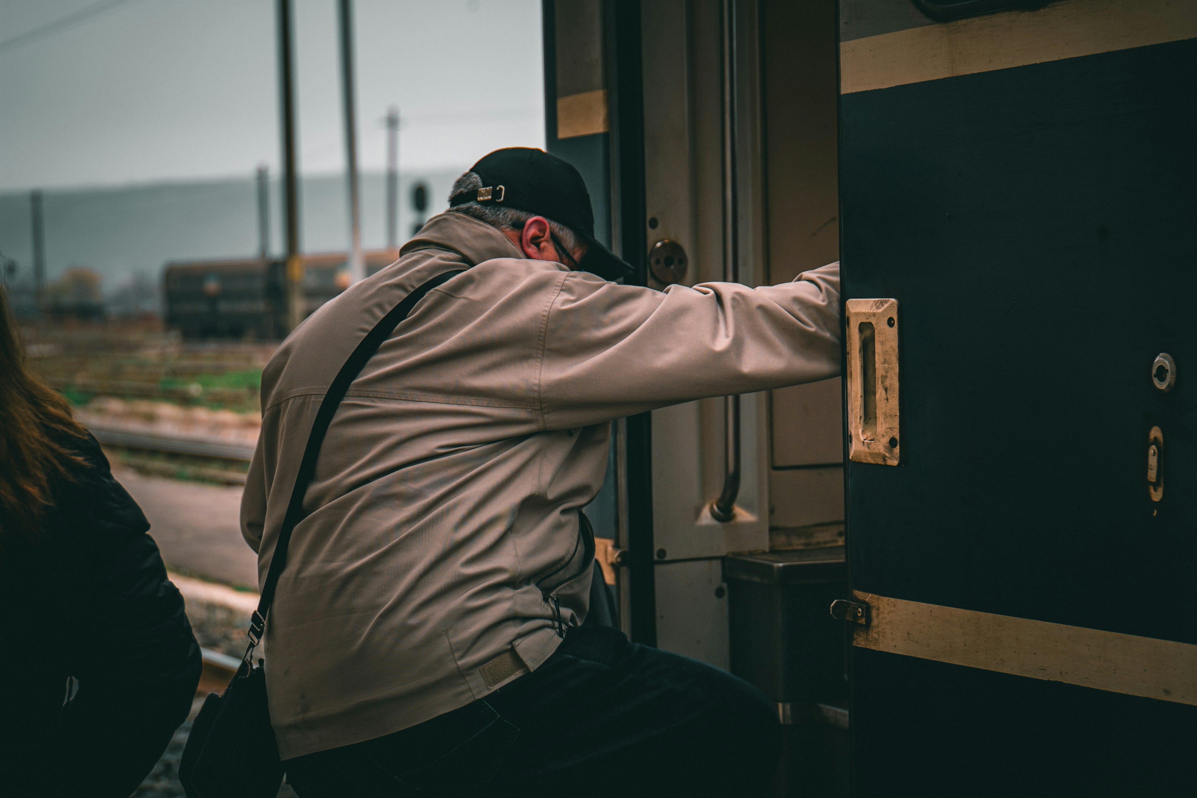 On the Threshold: A Patched Grip at the Open Car Door