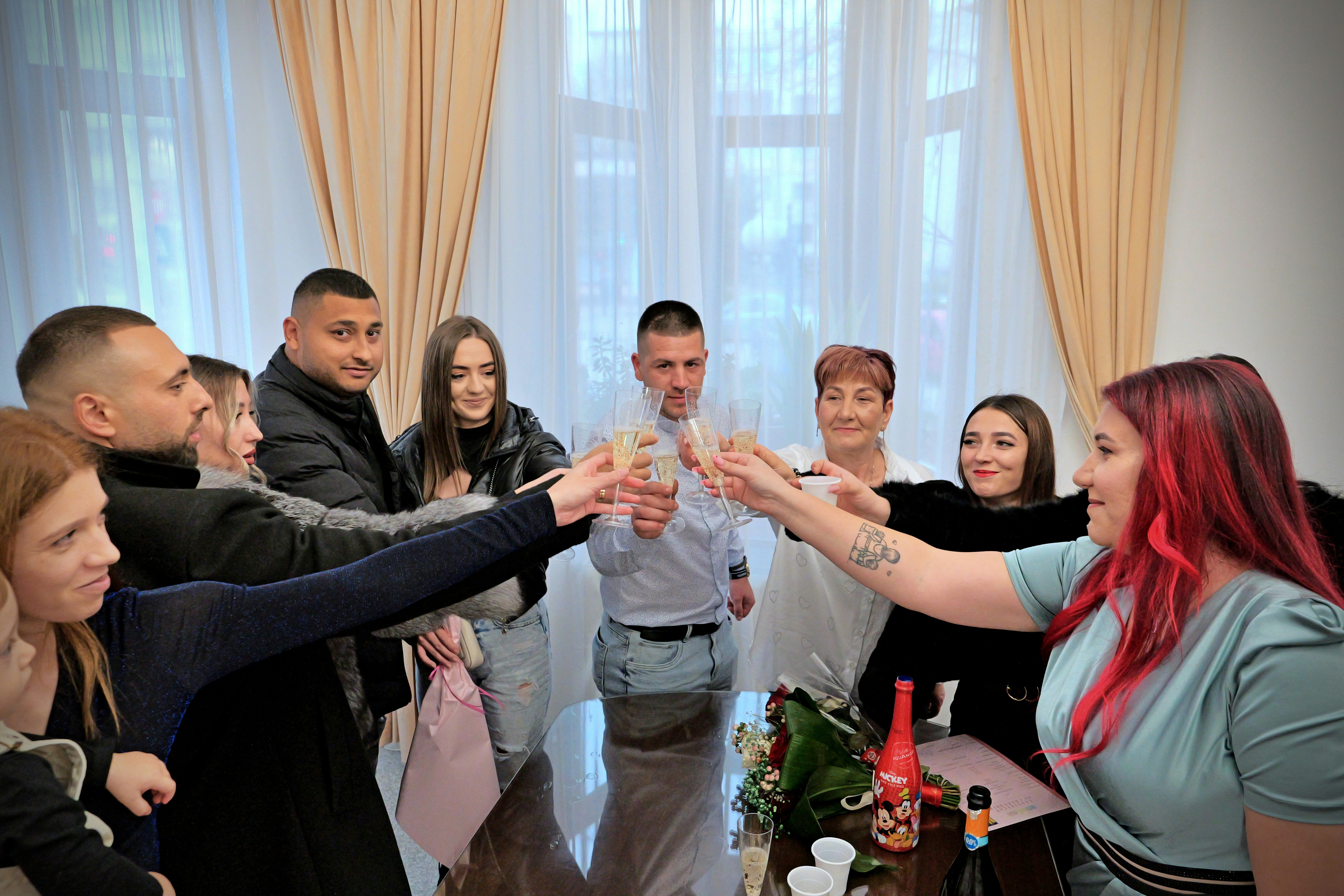 Toast at the Table: A Festive Moment Among Friends