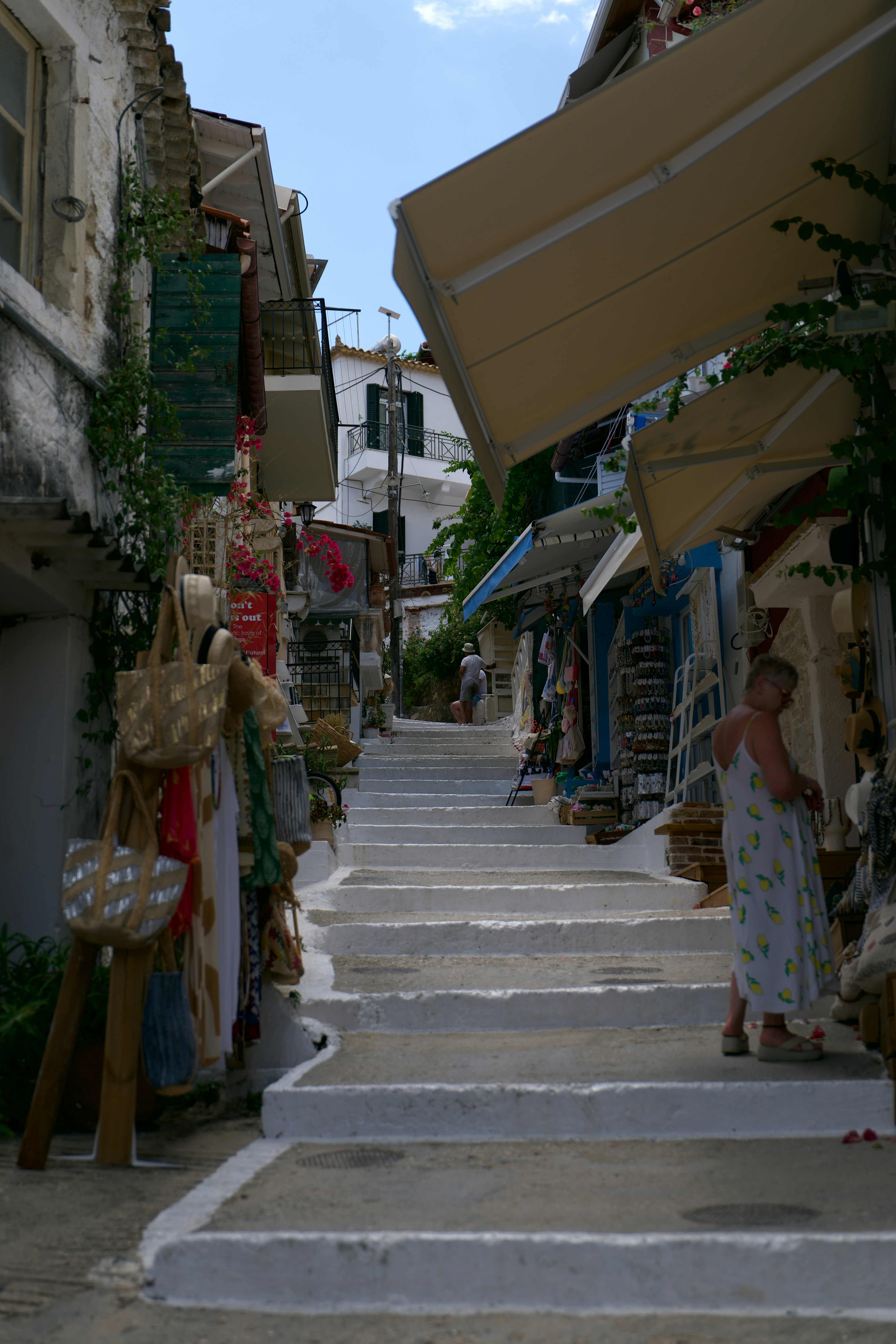 Sunlit Staircase Through a Quirky Market Lane