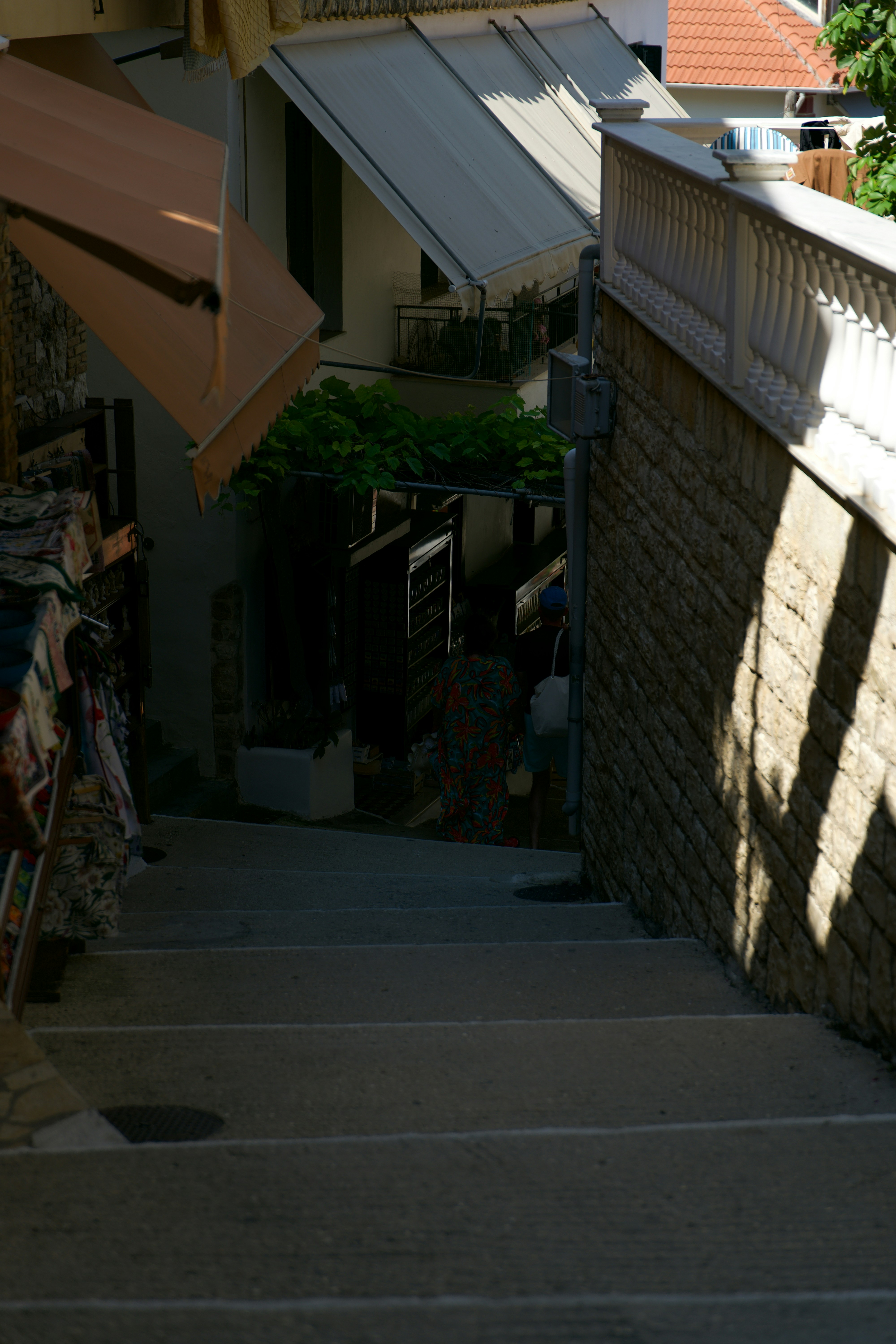 Shadowed Staircase Through a Quiet Alleyway