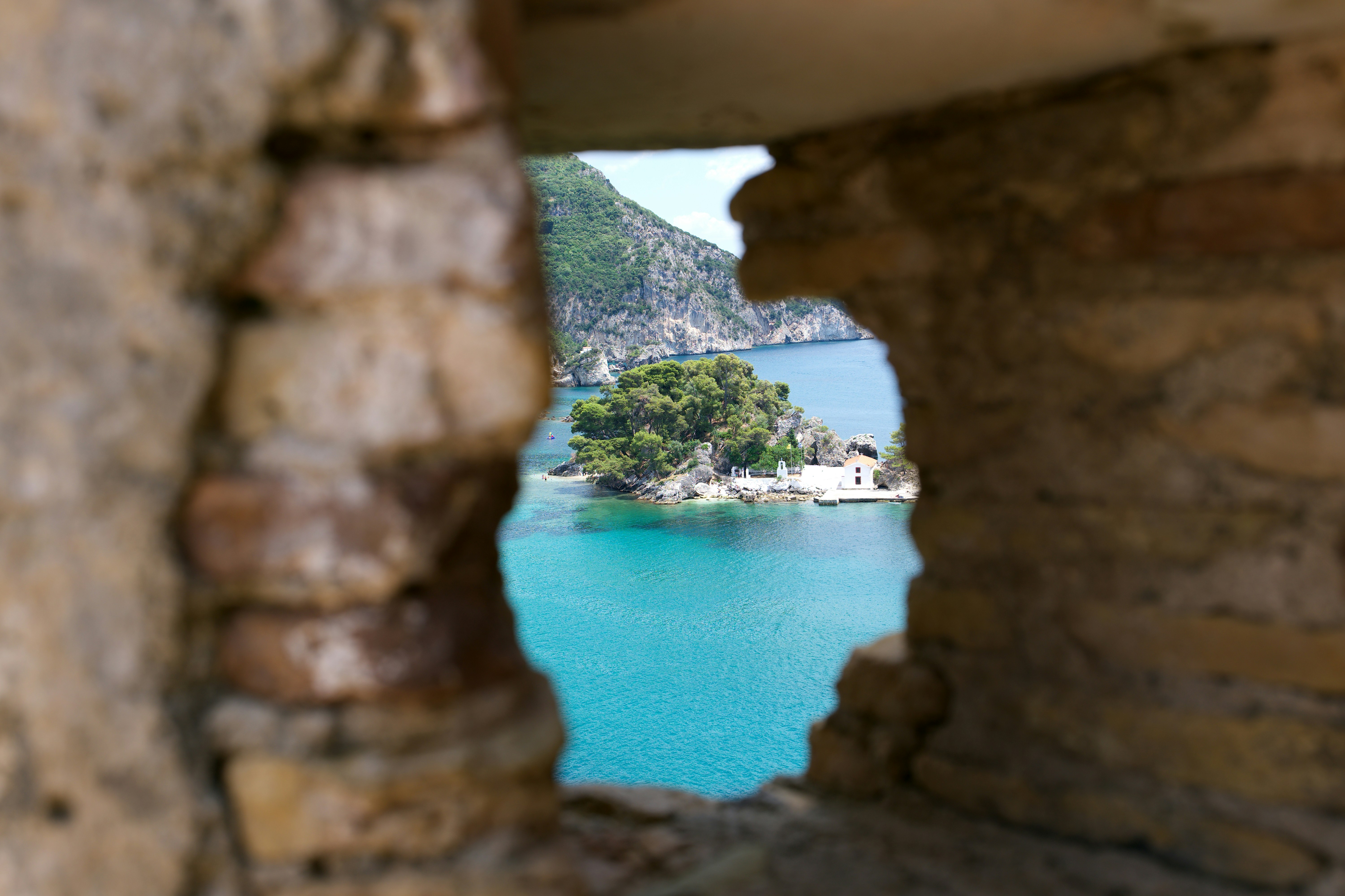 Through the Stone Window to a Turquoise Cove